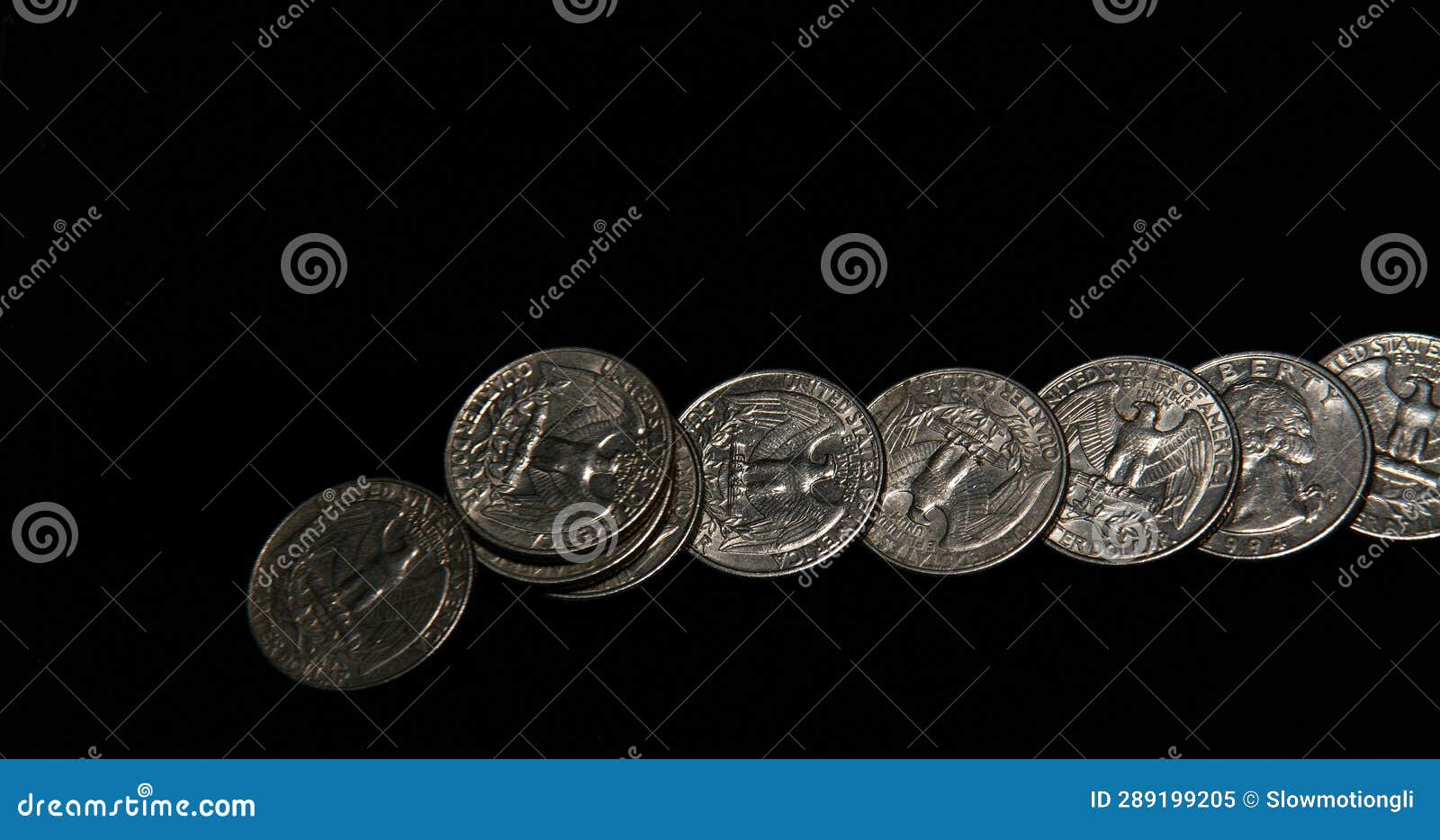Quarter Dollar Coins Falling, Rolling and Sliding on Black Background ...