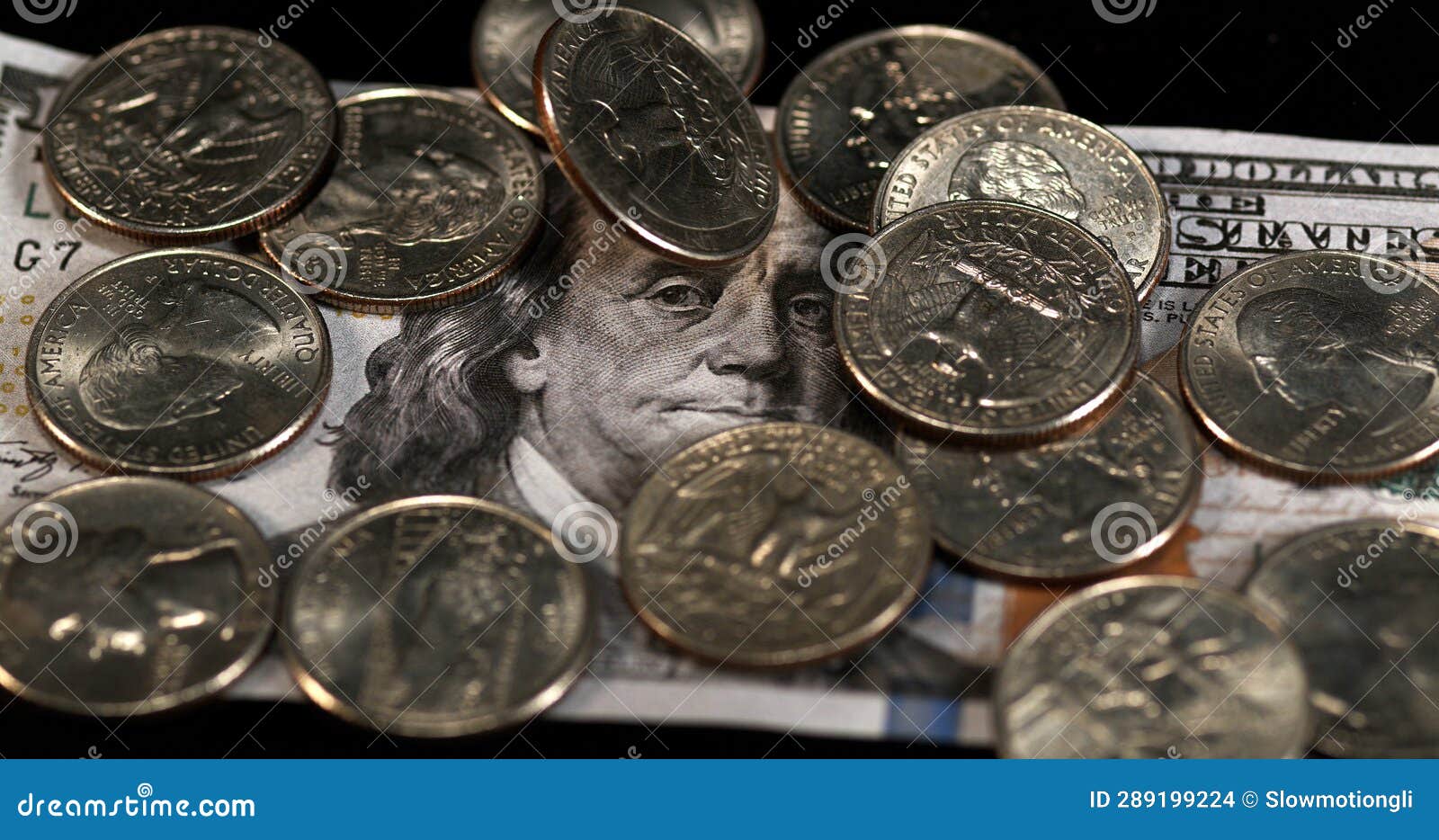 Quarter Dollar Coins Falling, Rolling and Sliding on Black Background ...