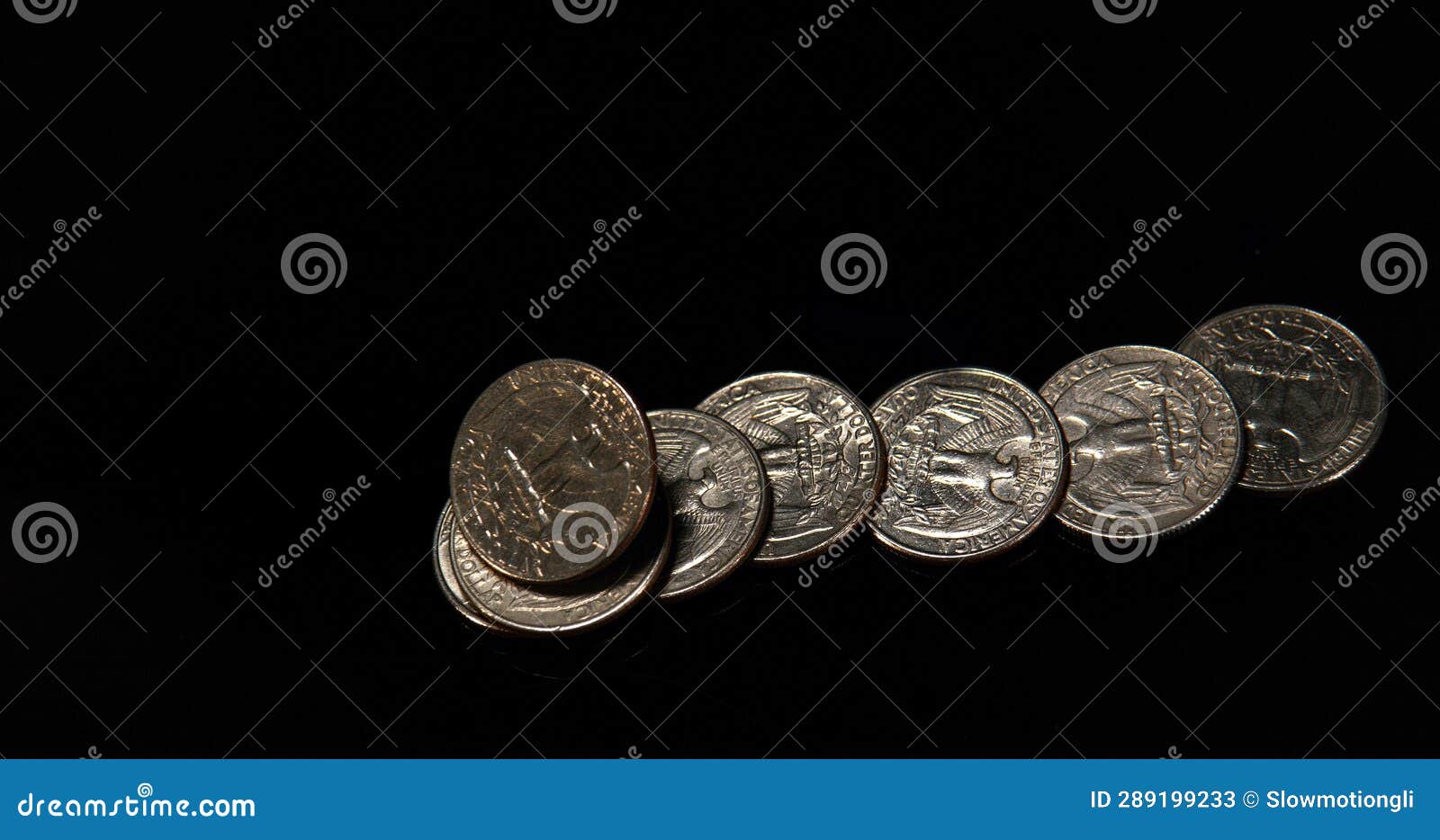 Quarter Dollar Coins Falling, Rolling and Sliding on Black Background ...