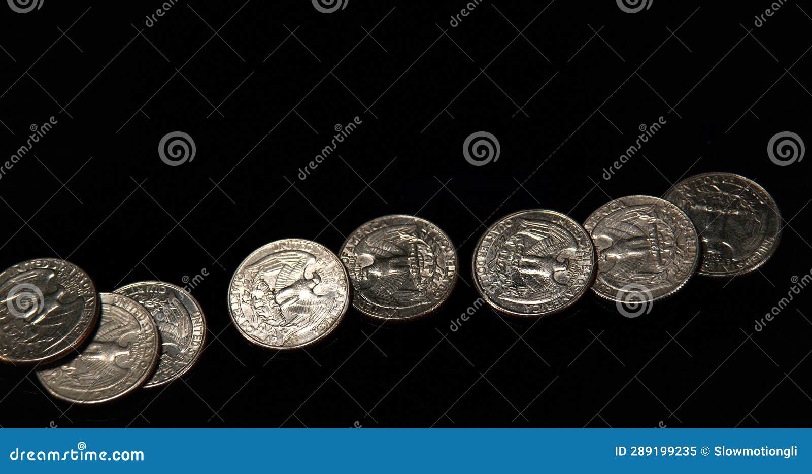 Quarter Dollar Coins Falling, Rolling and Sliding on Black Background ...