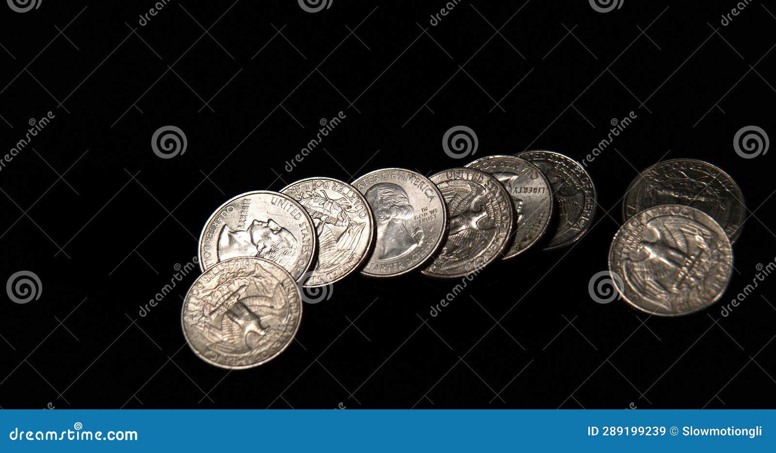 Quarter Dollar Coins Falling, Rolling and Sliding on Black Background ...
