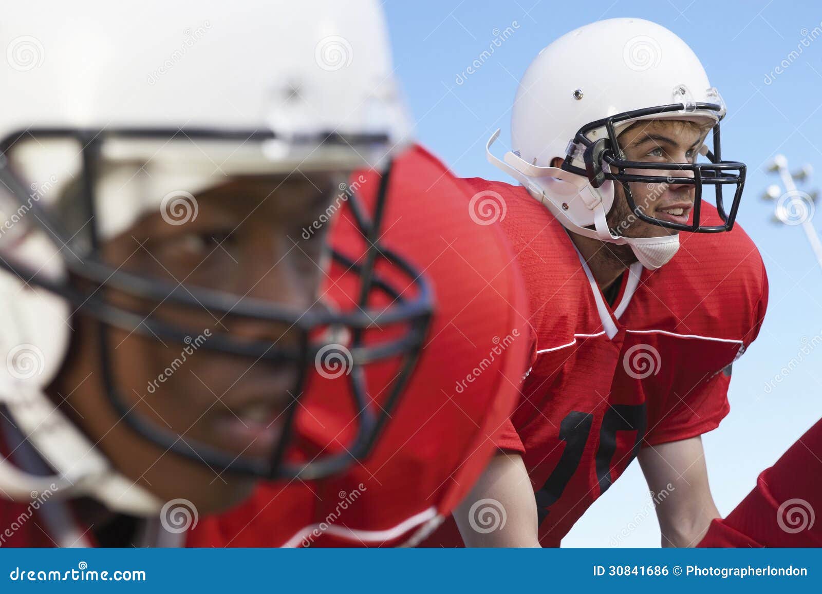 Quarterback Waiting for Snap Stock Photo - Image of closeup, football ...