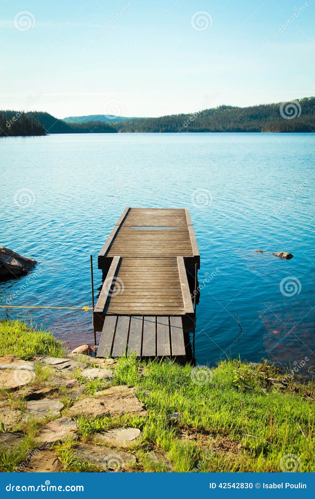 Quay on a calm lake stock photo. Image of river, water - 42542830