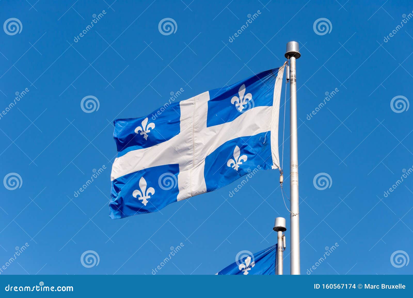 Quebec Flag Close To The Olympic Stadium Drapeaux Royalty-Free Stock ...