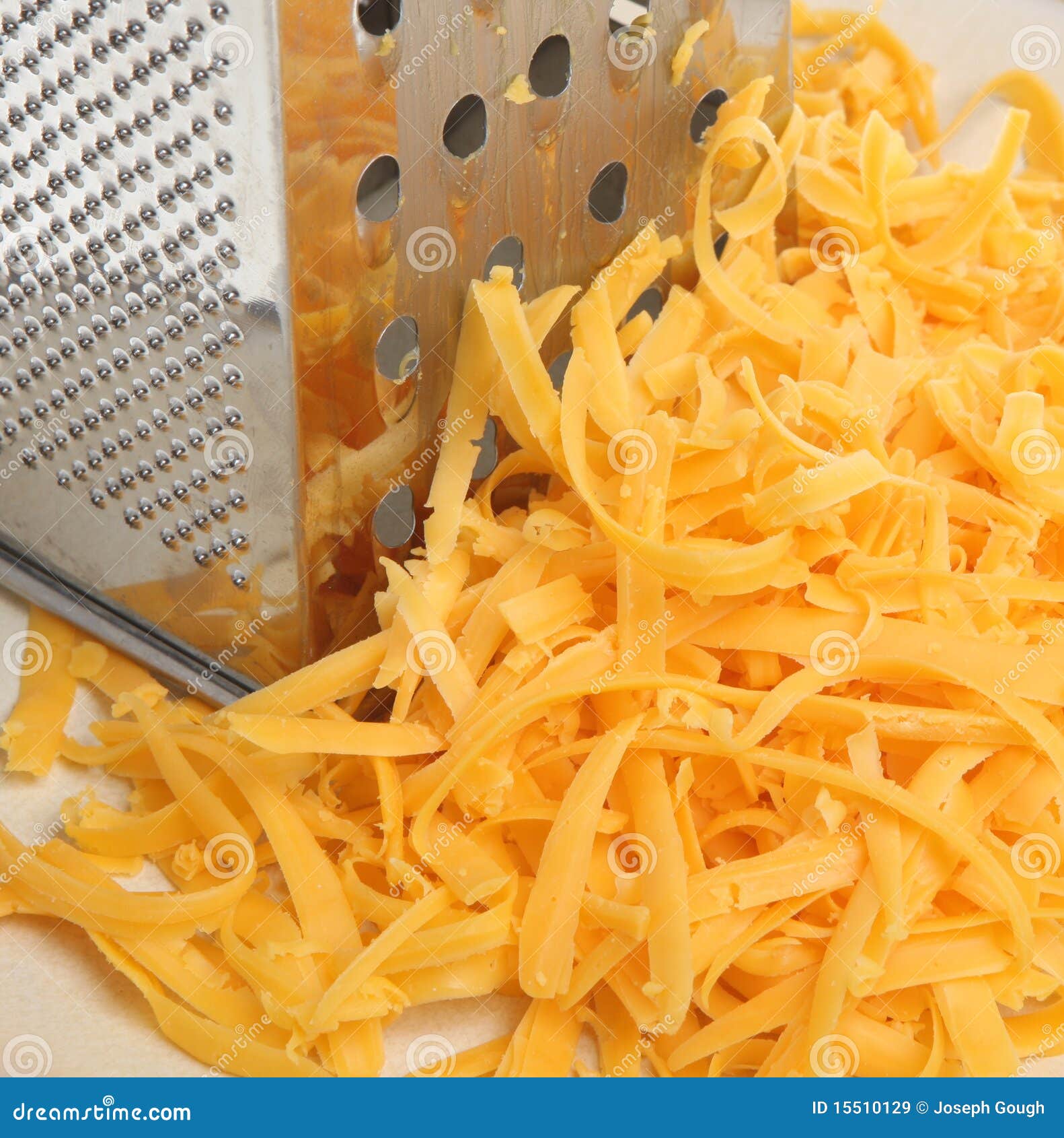 Queso rallado imagen de archivo. Imagen de destrozado - 15510129