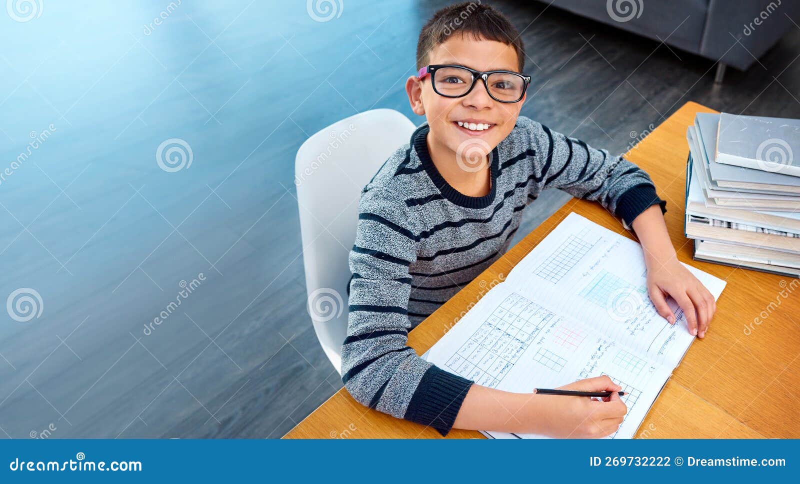 On the Quest for Knowledge. Portrait of a Determined Young Boy Doing ...