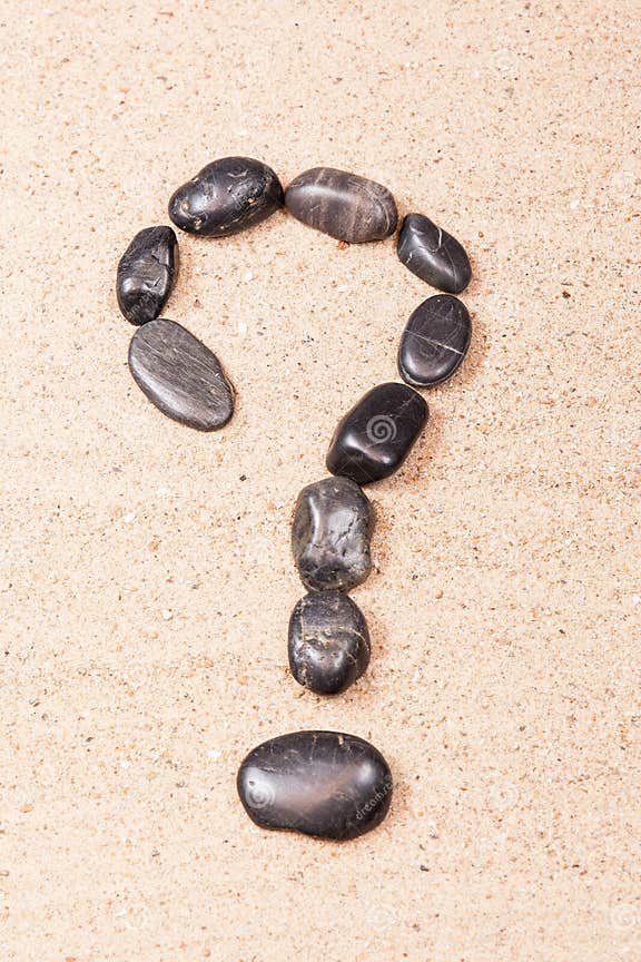 Question Mark Drawn with Pebbles on the Sand Stock Photo - Image of ...