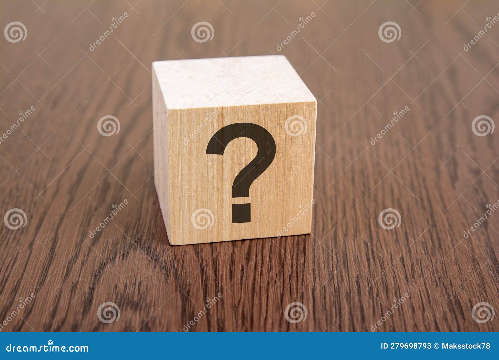 Question Mark Drawn on a Wooden Cube with Copy Space on a Dark Wooden ...