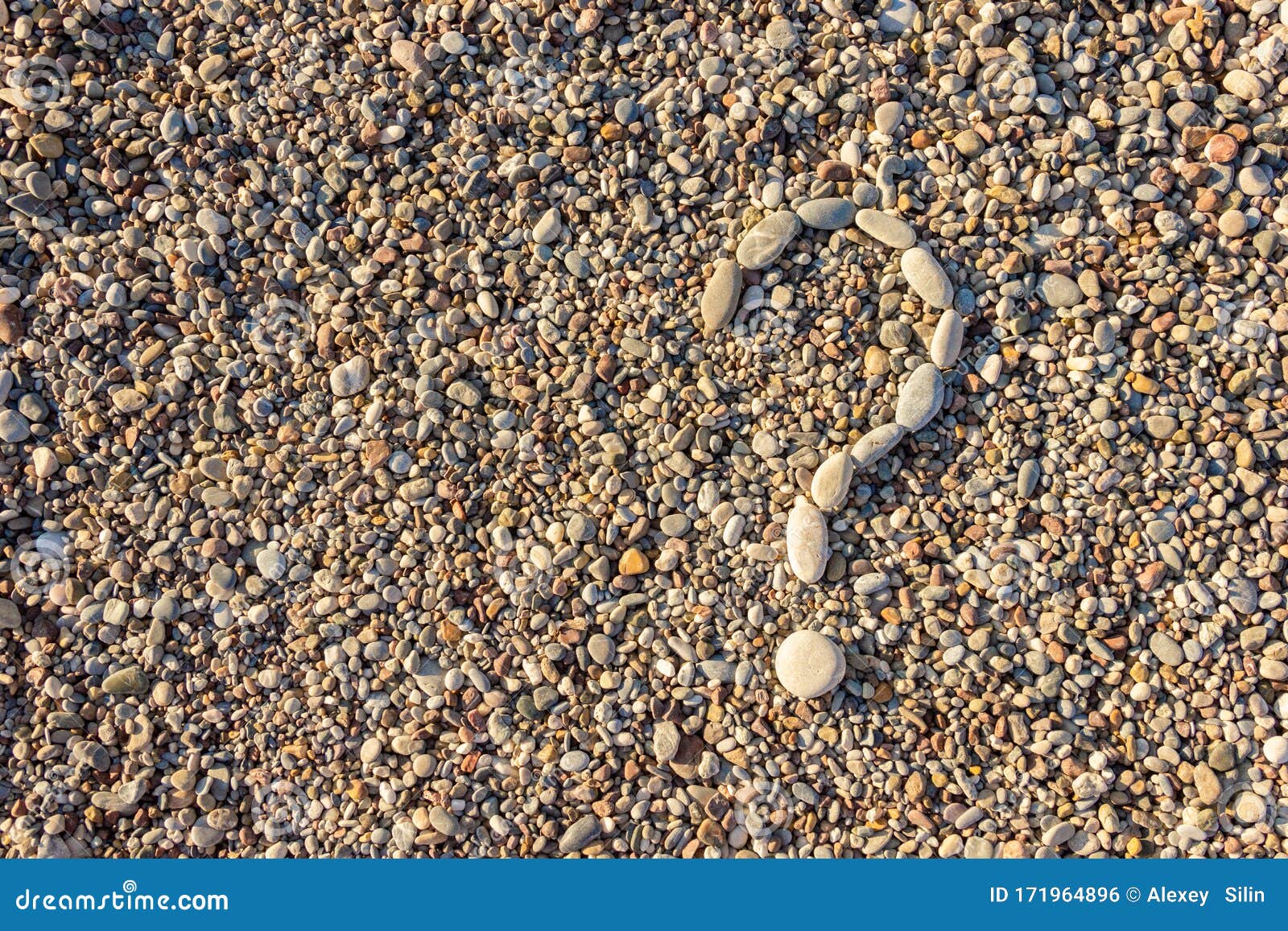 Question Mark Lined with Stones on a Background of Pebbles. Stones ...