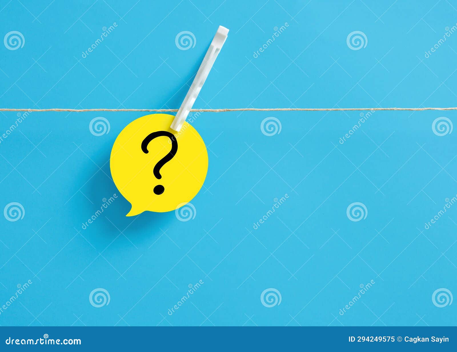 Question Mark Symbol on a Speech Bubble Hanging on Clothesline with a ...