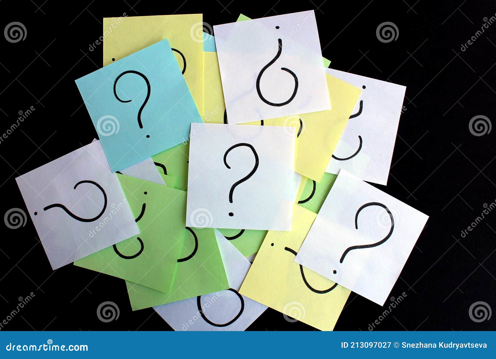 Question Marks Drawn on Small Pieces of Paper Superimposed in a Pile ...
