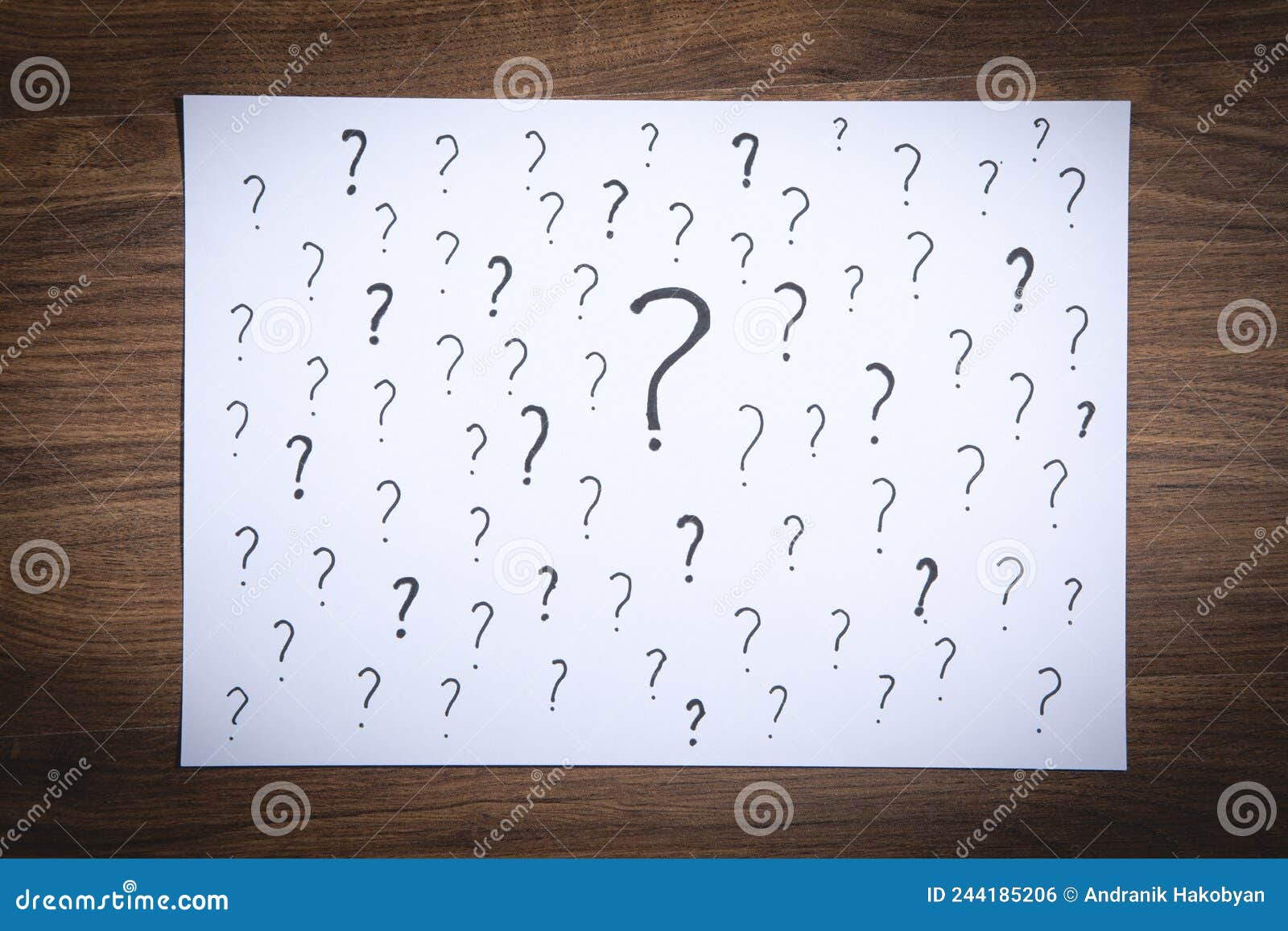 Question Marks on Paper on the Wooden Table Stock Photo - Image of ...