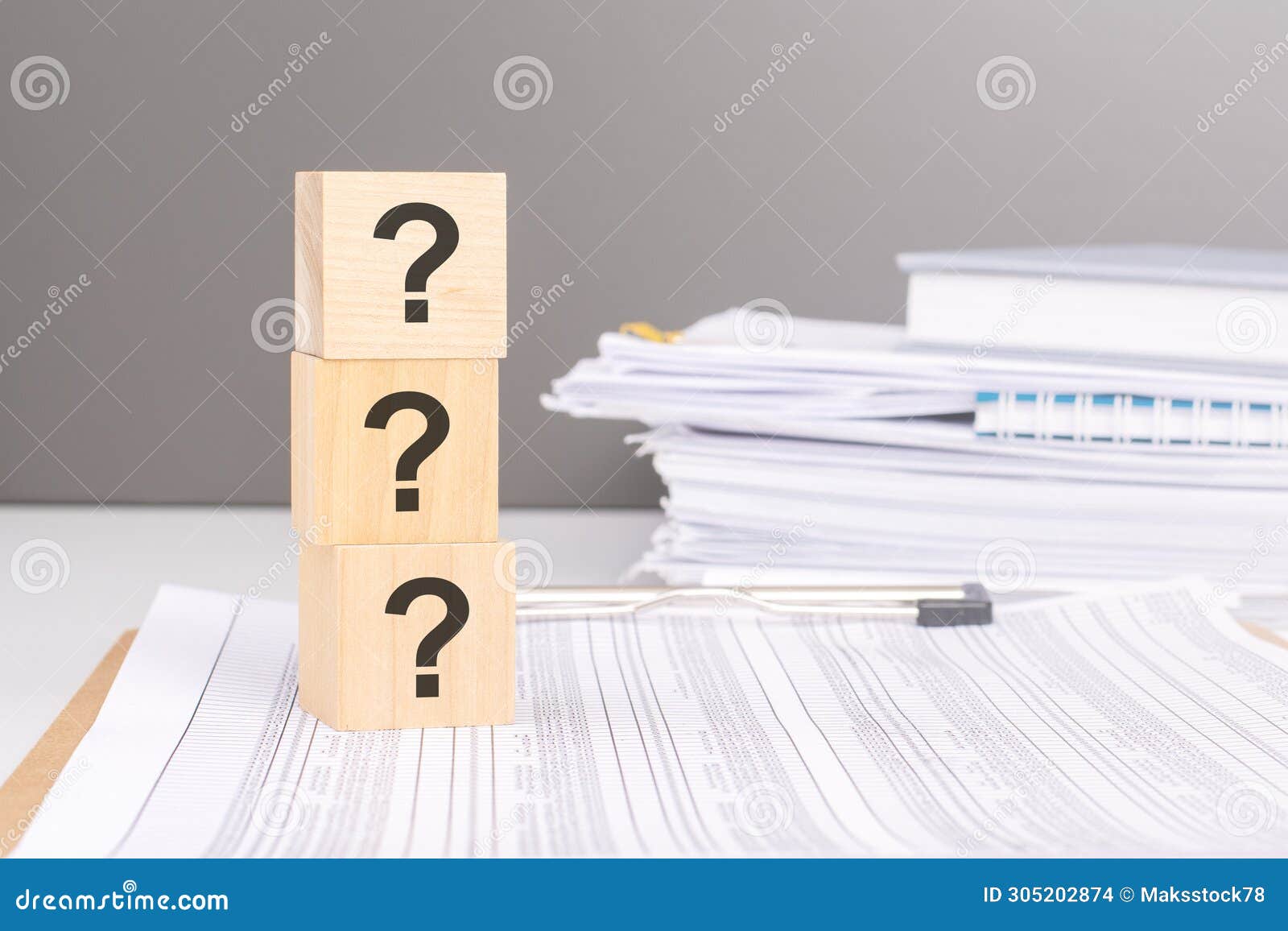 Question Marks on Wooden Blocks. Business Concept. Gray Background ...
