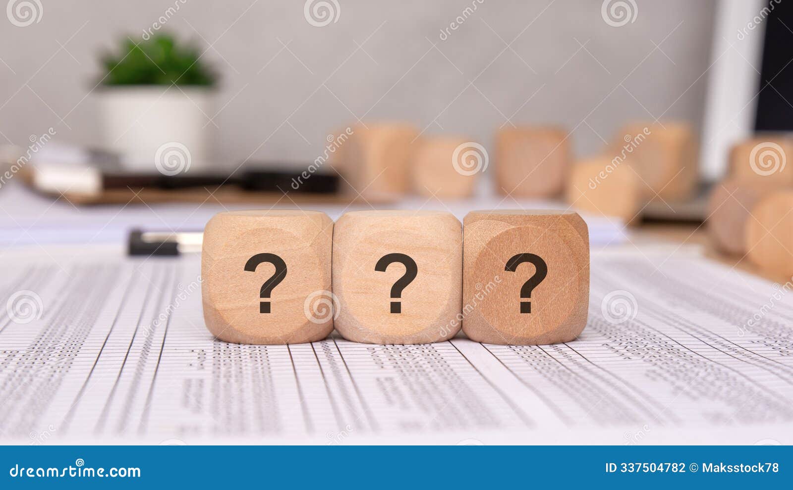 Question Marks on Wooden Blocks Representing Inquiry and Curiosity in ...