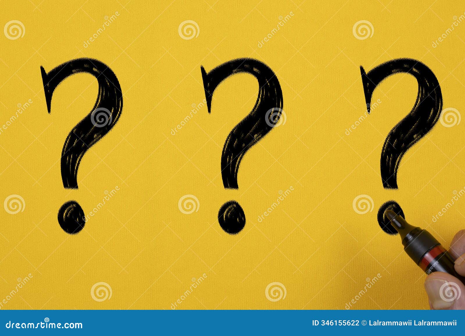 Question Marks Written on Yellow Background. Hand with Pen Highlighter ...