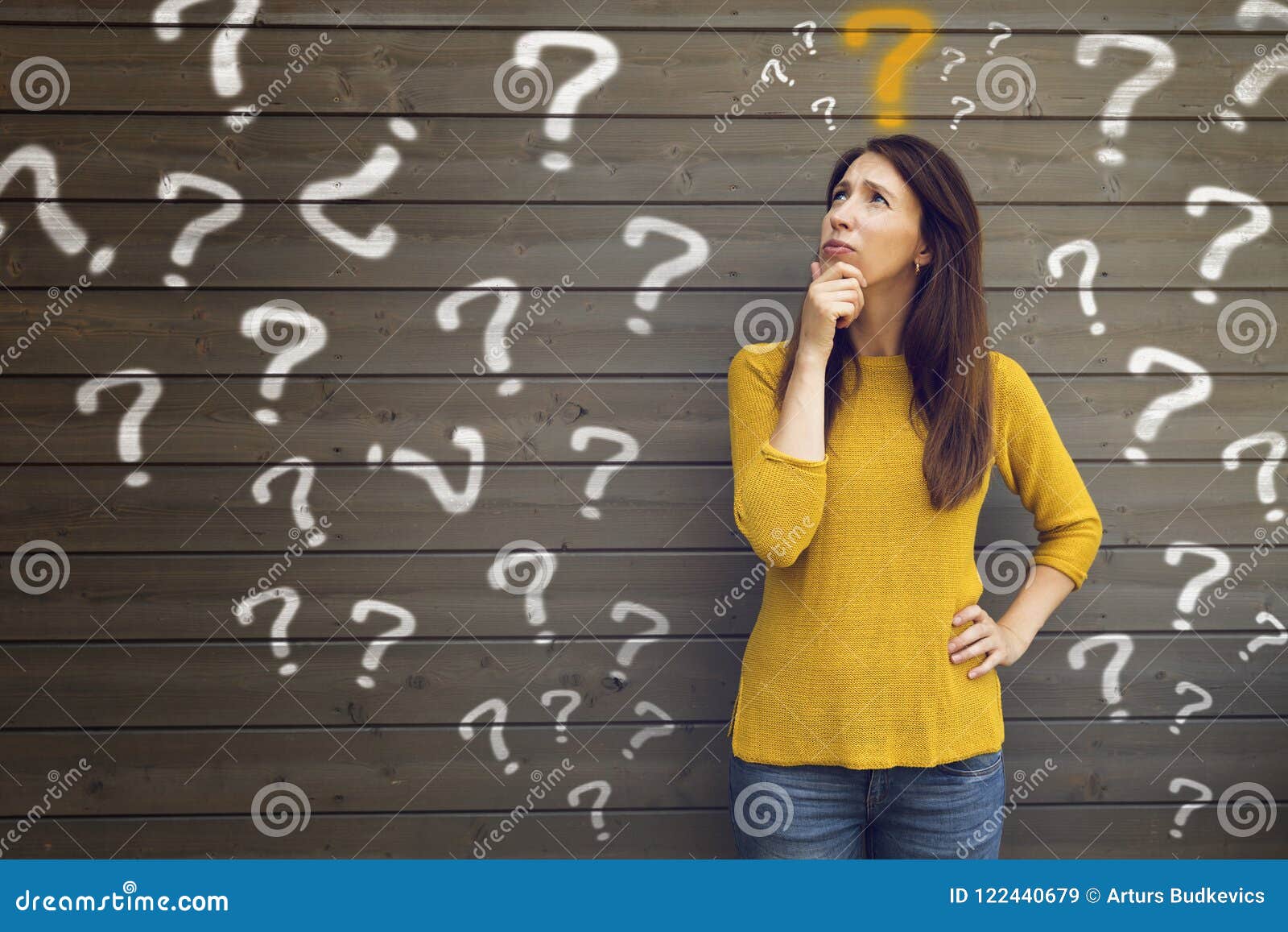 Question Marks with Young Woman in a Thoughtful Pose Stock Image ...