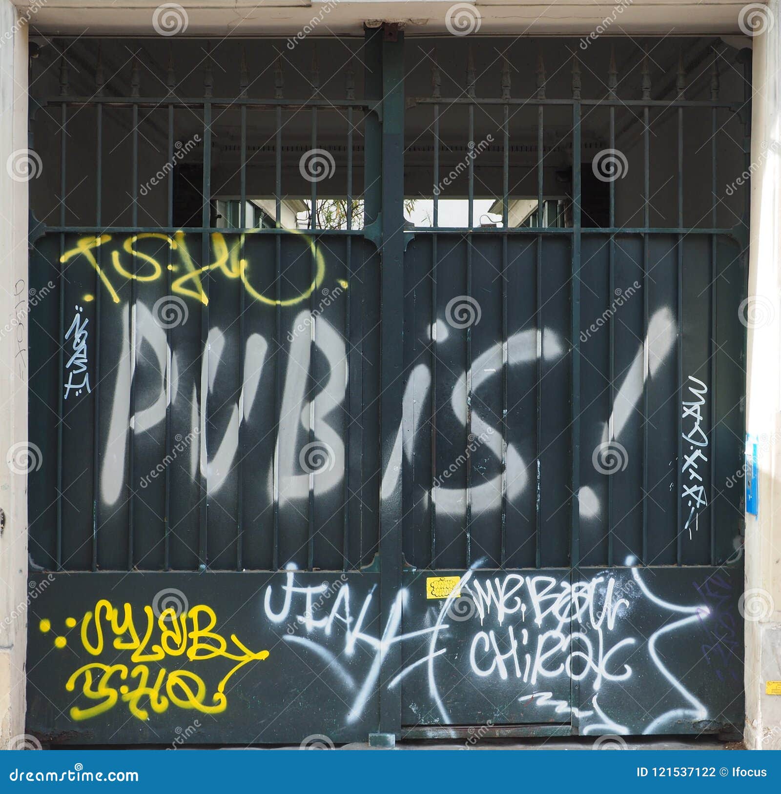 Questionable Tag on Building Gate Stock Photo - Image of french ...