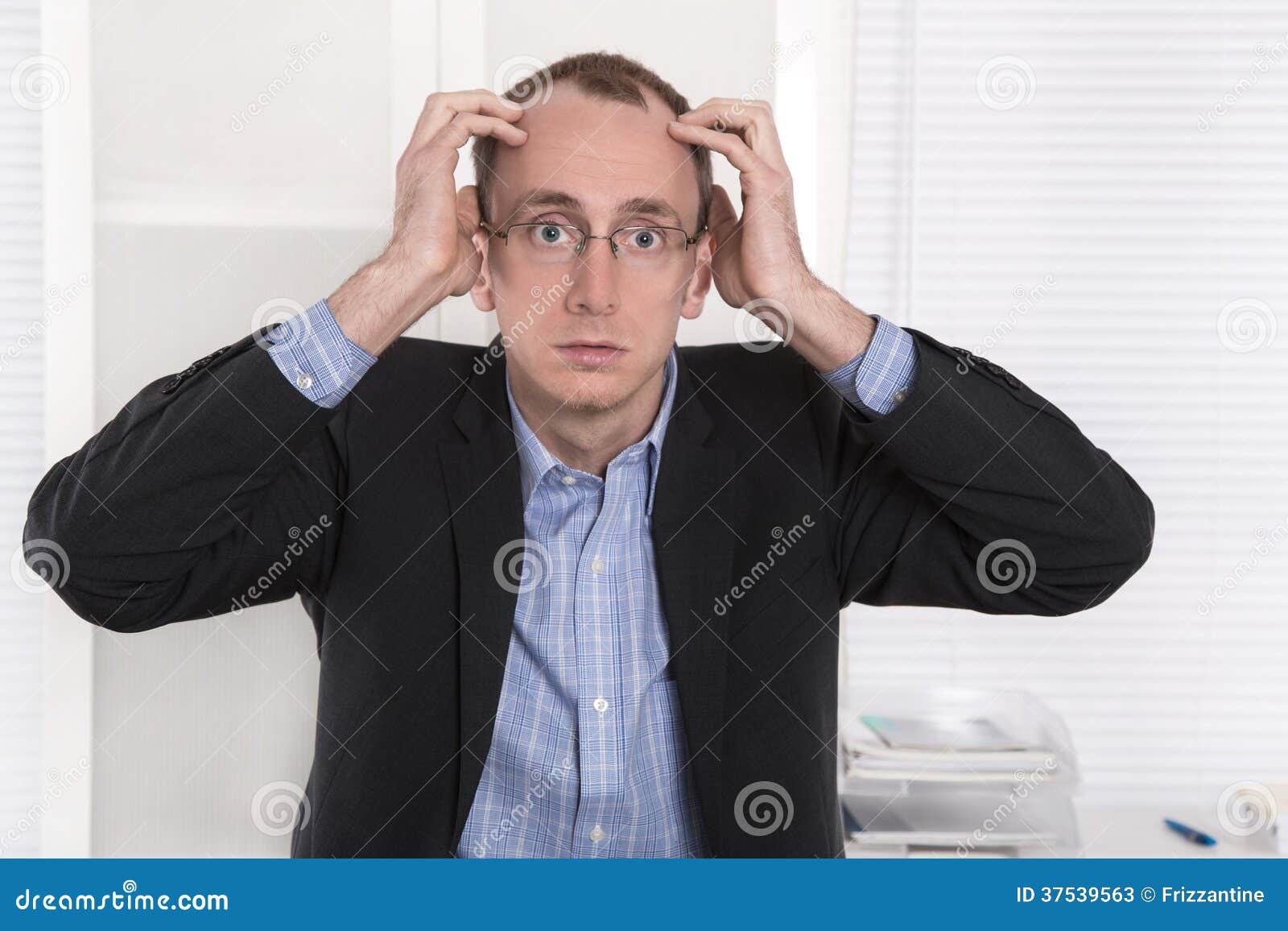 Questioningly Bald Engineer or Specialist Sitting at Desk. Stock Image ...