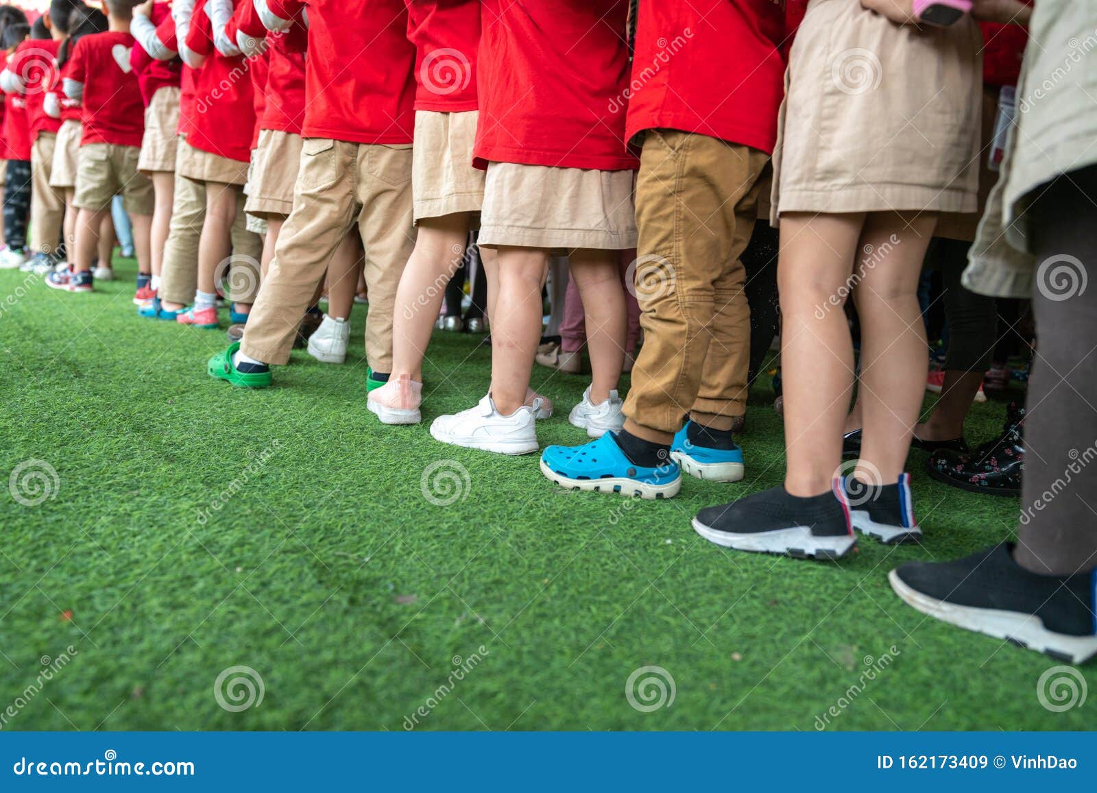 Queue of Asian Kids in School Uniform Standing in Line Editorial Stock ...