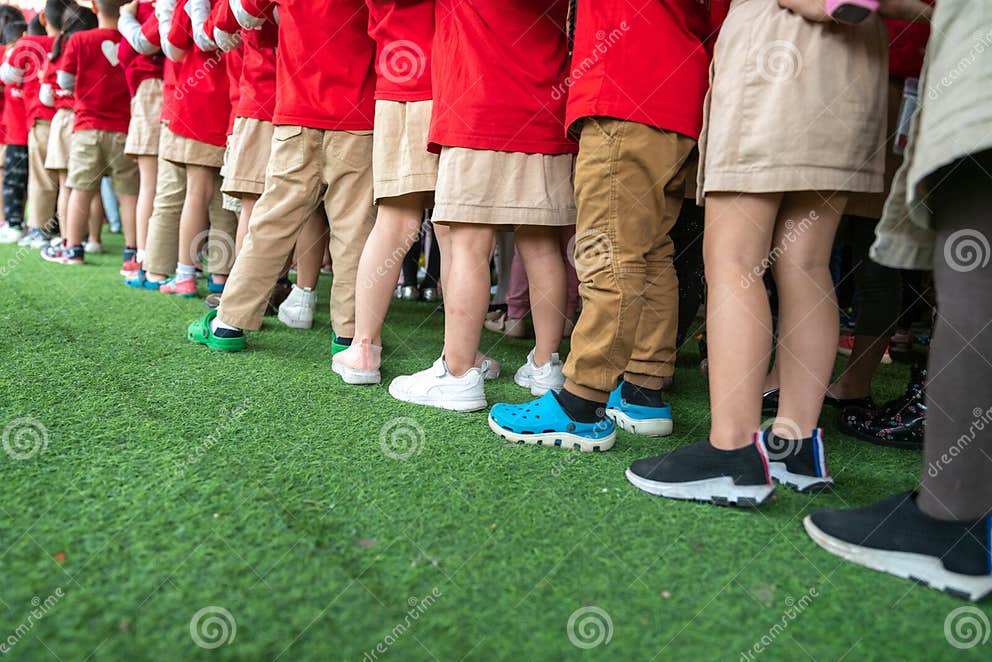 Queue of Asian Kids in School Uniform Standing in Line Editorial Stock ...
