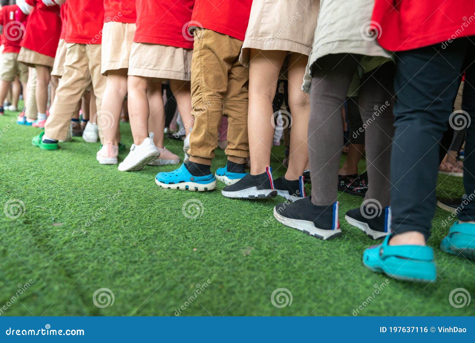Queue of Asian Kids in School Uniform Standing in Line Stock Photo ...