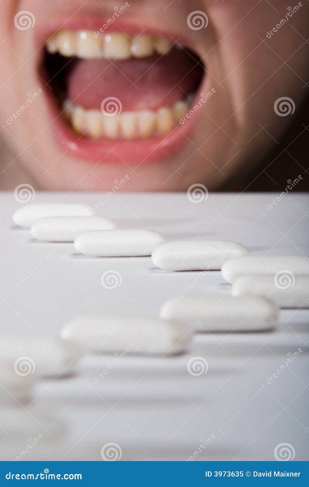 Queue of Chewing Gums Heading To Open Mouth Stock Image - Image of ...