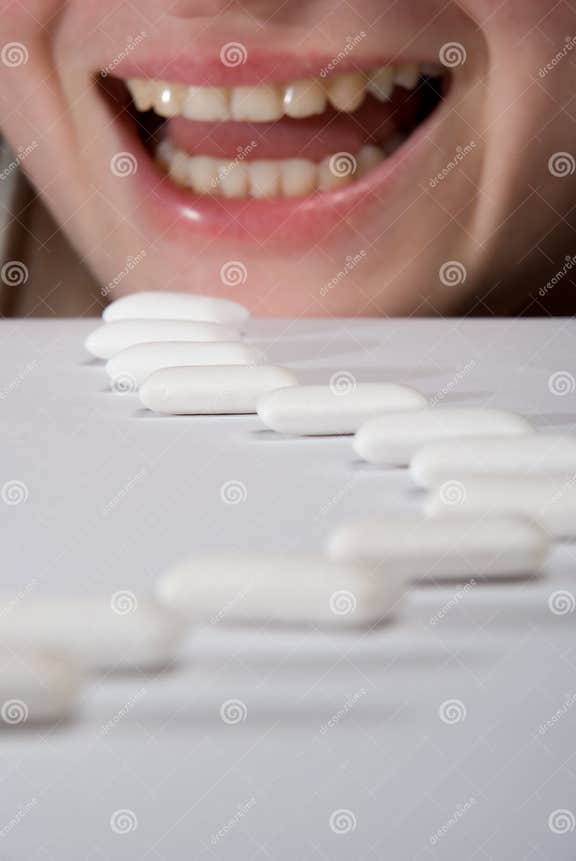 Queue of Chewing Gums Heading To Open Mouth Stock Image - Image of ...
