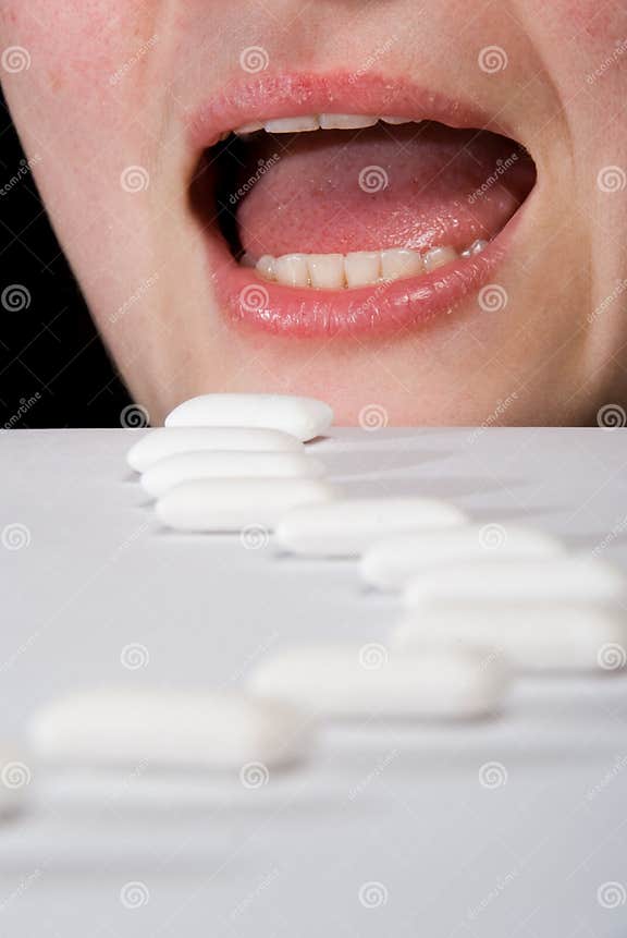 Queue of Chewing Gums Heading To Open Mouth Stock Image - Image of ...