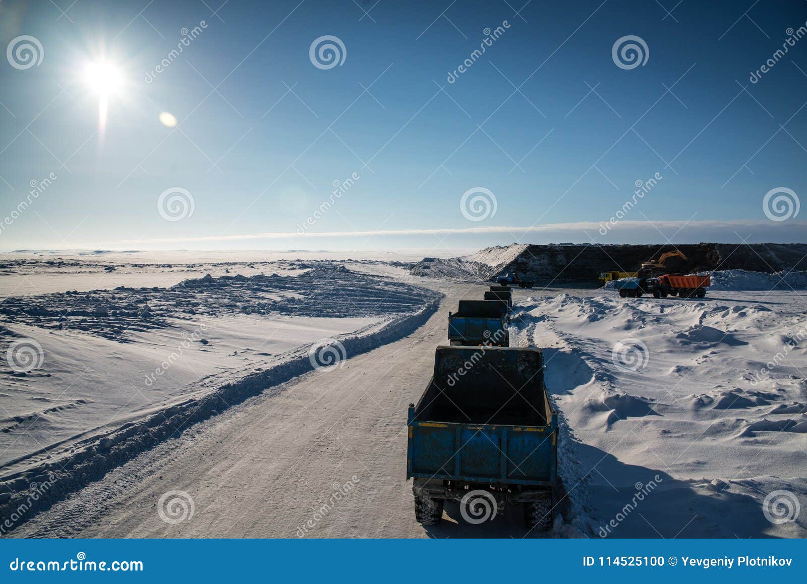 A Queue of Dump Trucks for Loading. Stock Photo - Image of hard, snow ...