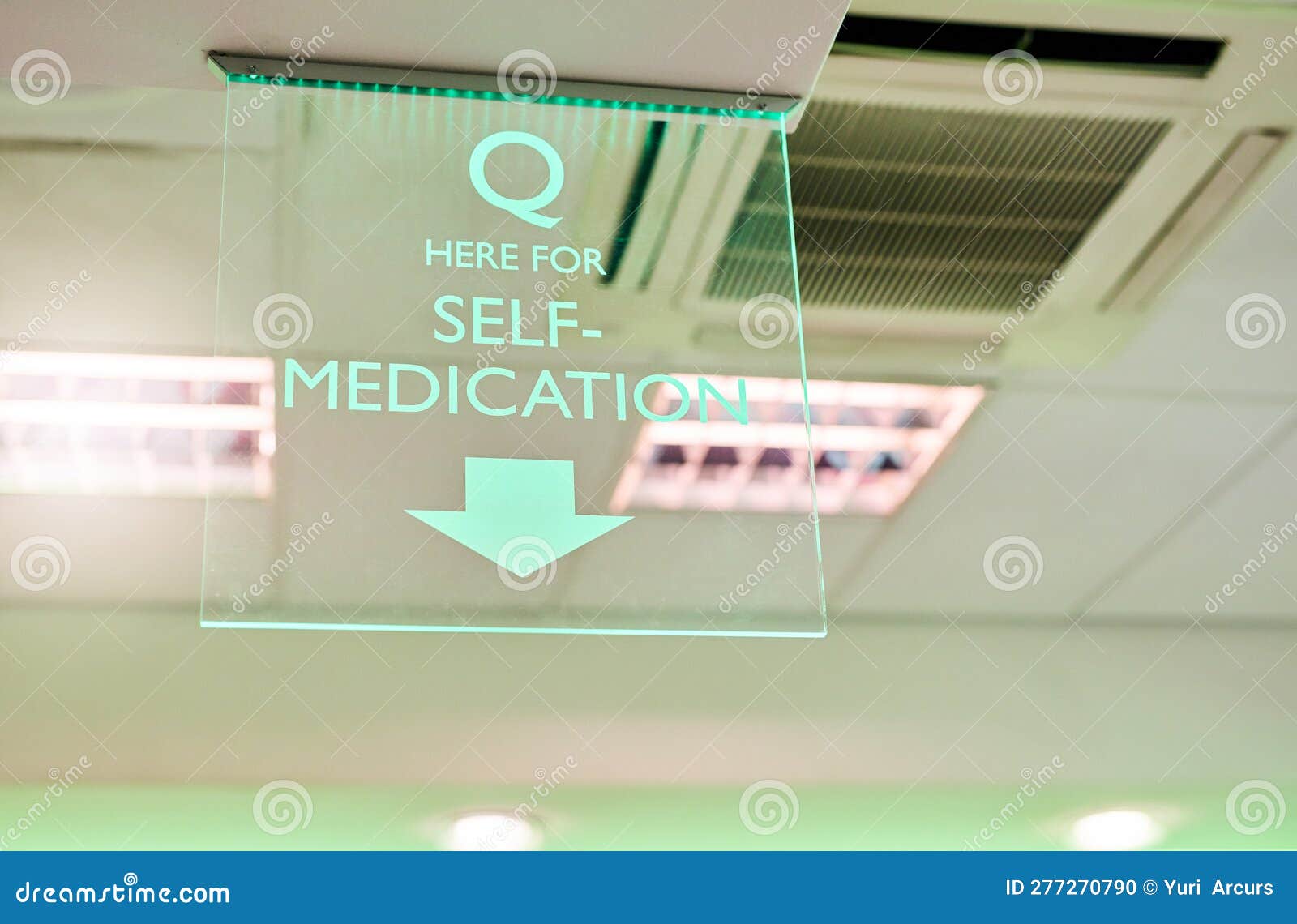 Queue Here for Your Wellbeing. a Self-medication Sign in a Pharmacy ...