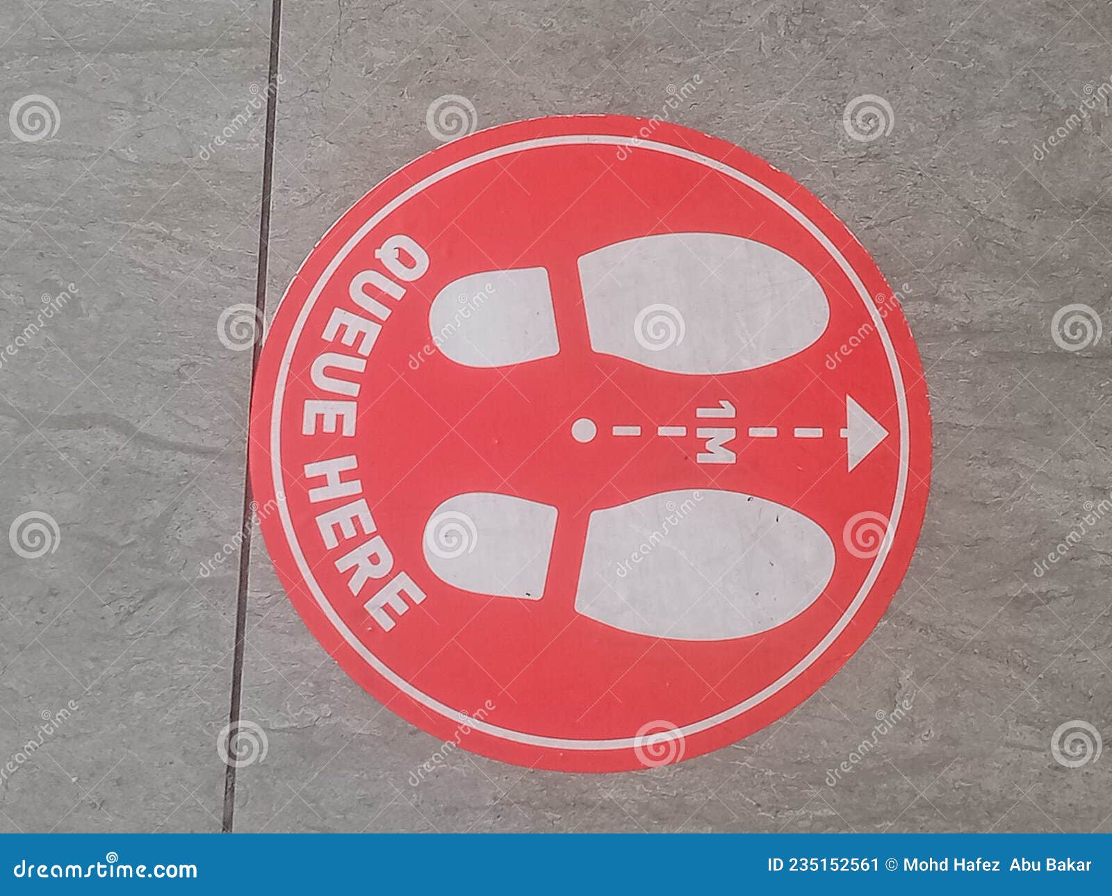 Queue sign on the floor stock image. Image of malaysia - 235152561