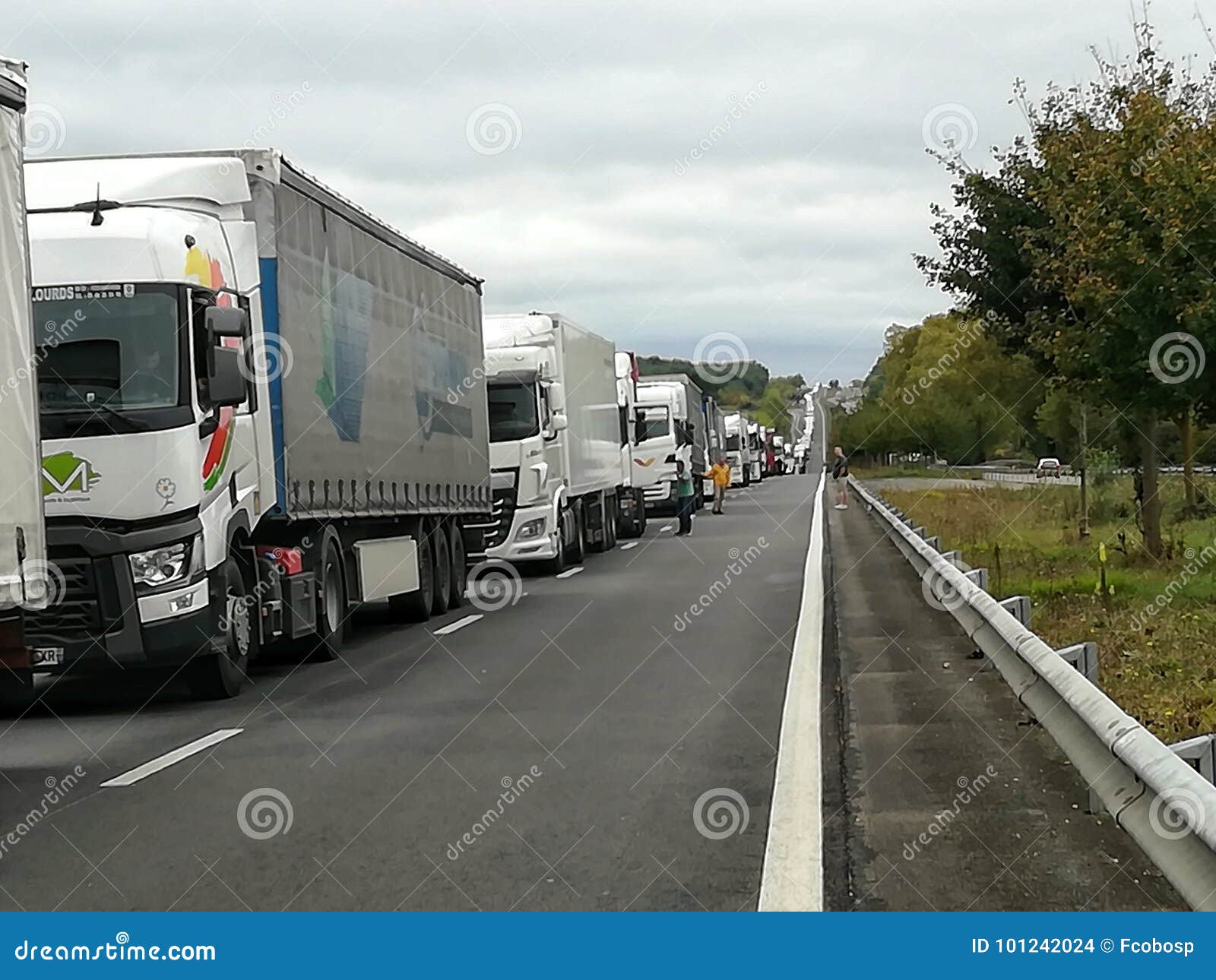 Queue of trucks editorial stock image. Image of france - 101242024