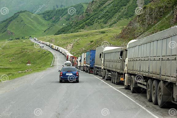 Queue of Trucks Waiting in Line for Border Customs Control Stock Photo ...