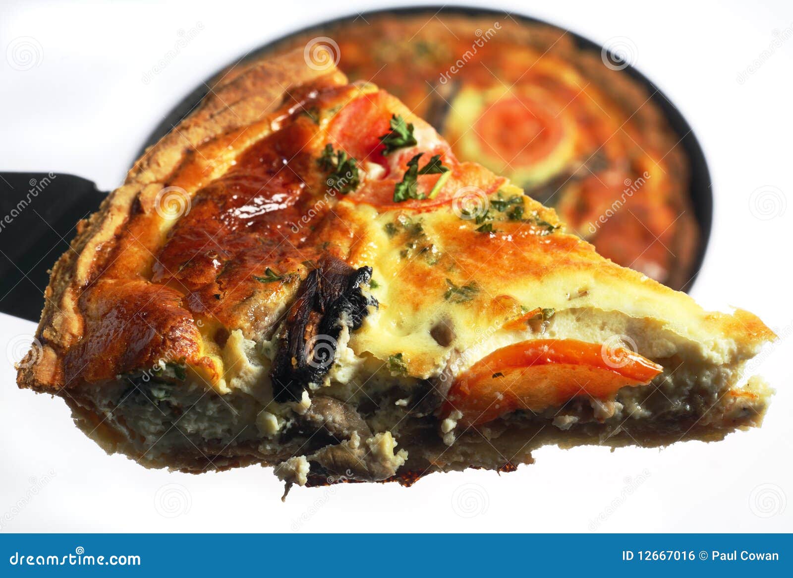 Quiche Slice Being Lifted from a Pan Stock Photo - Image of serving ...