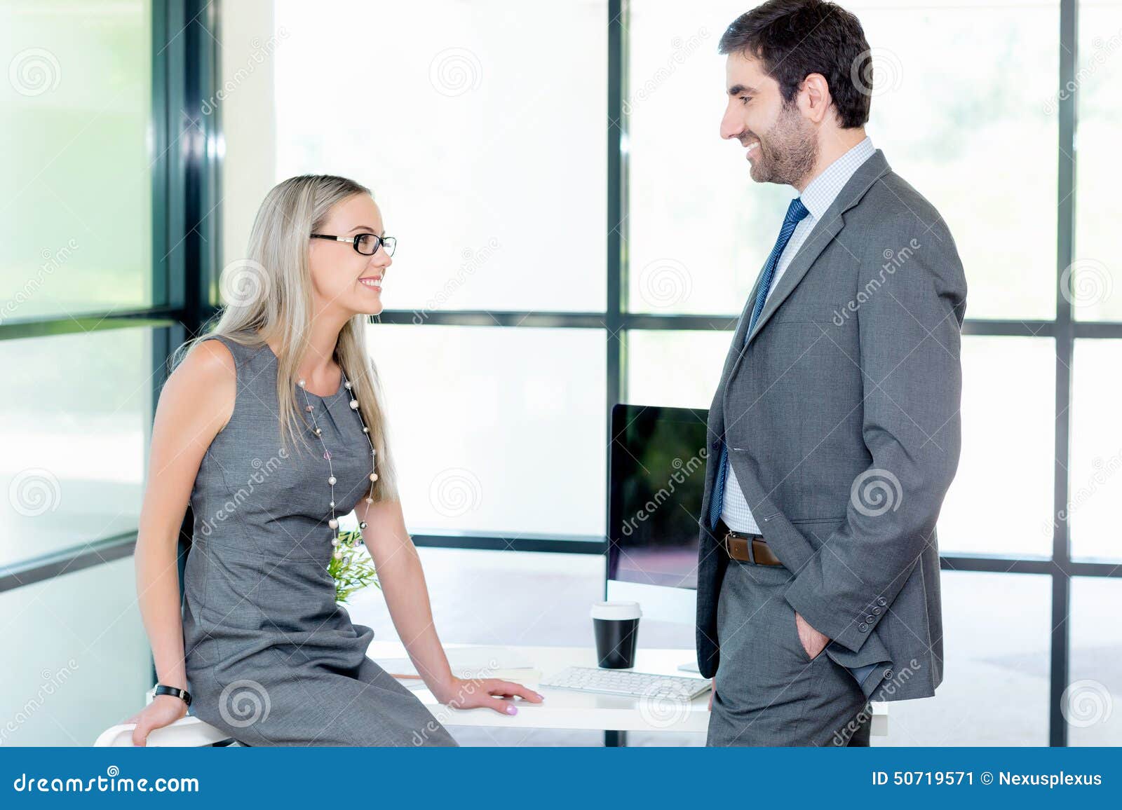 Quick Catch Up between Colleagues Stock Image - Image of colleague ...