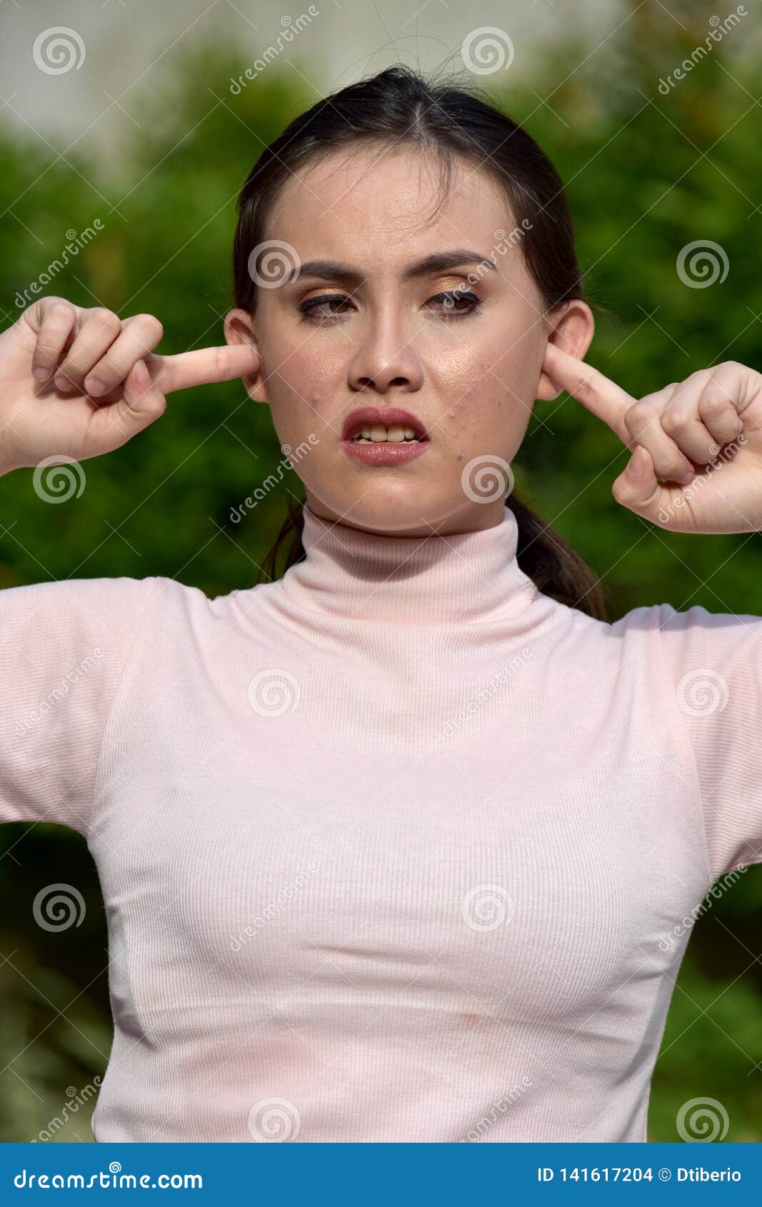 A Quiet Diverse Female stock photo. Image of female - 141617204