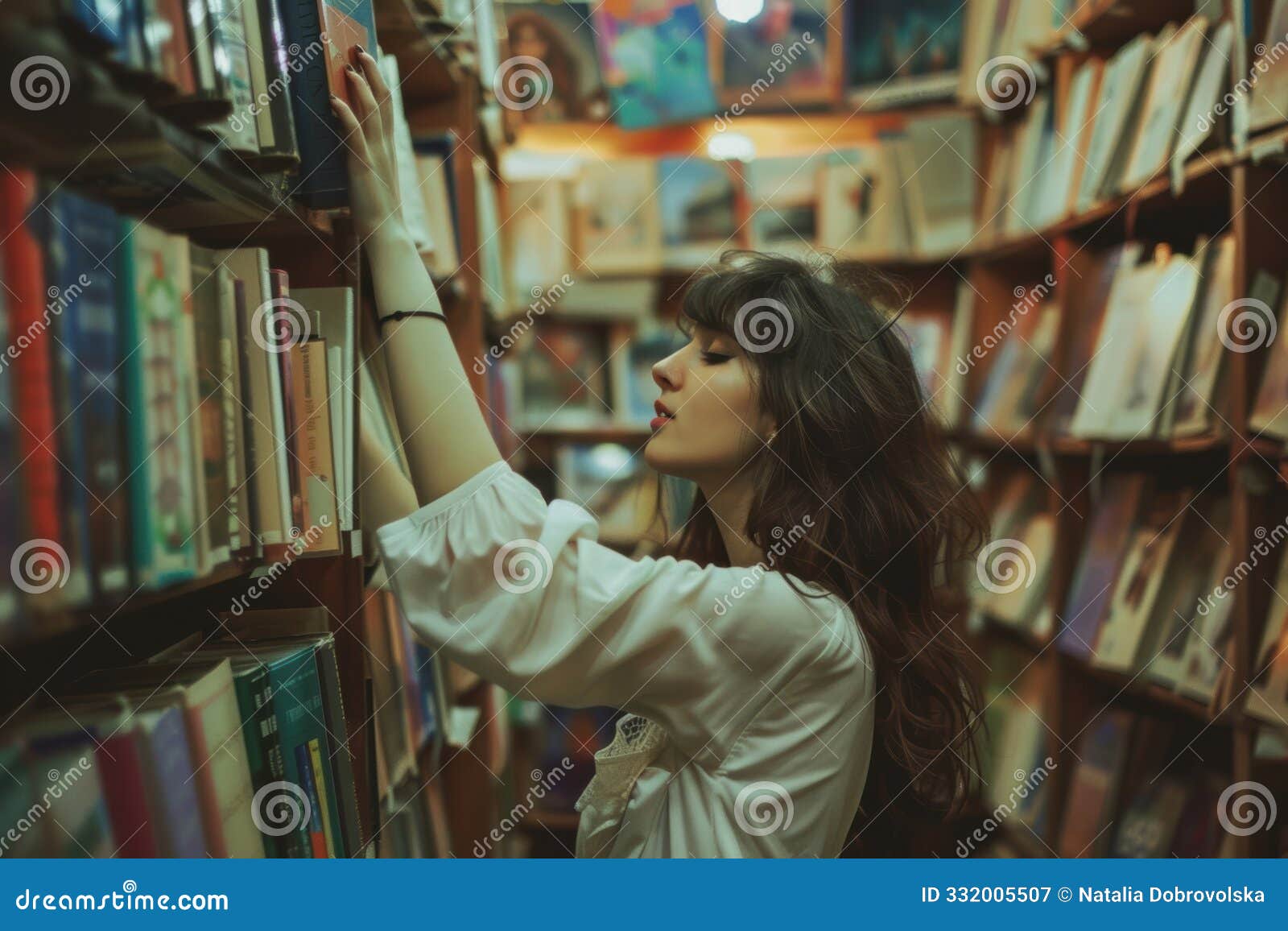 Quiet Library Interior with a Reading Area, Surrounded by Bookshelves ...