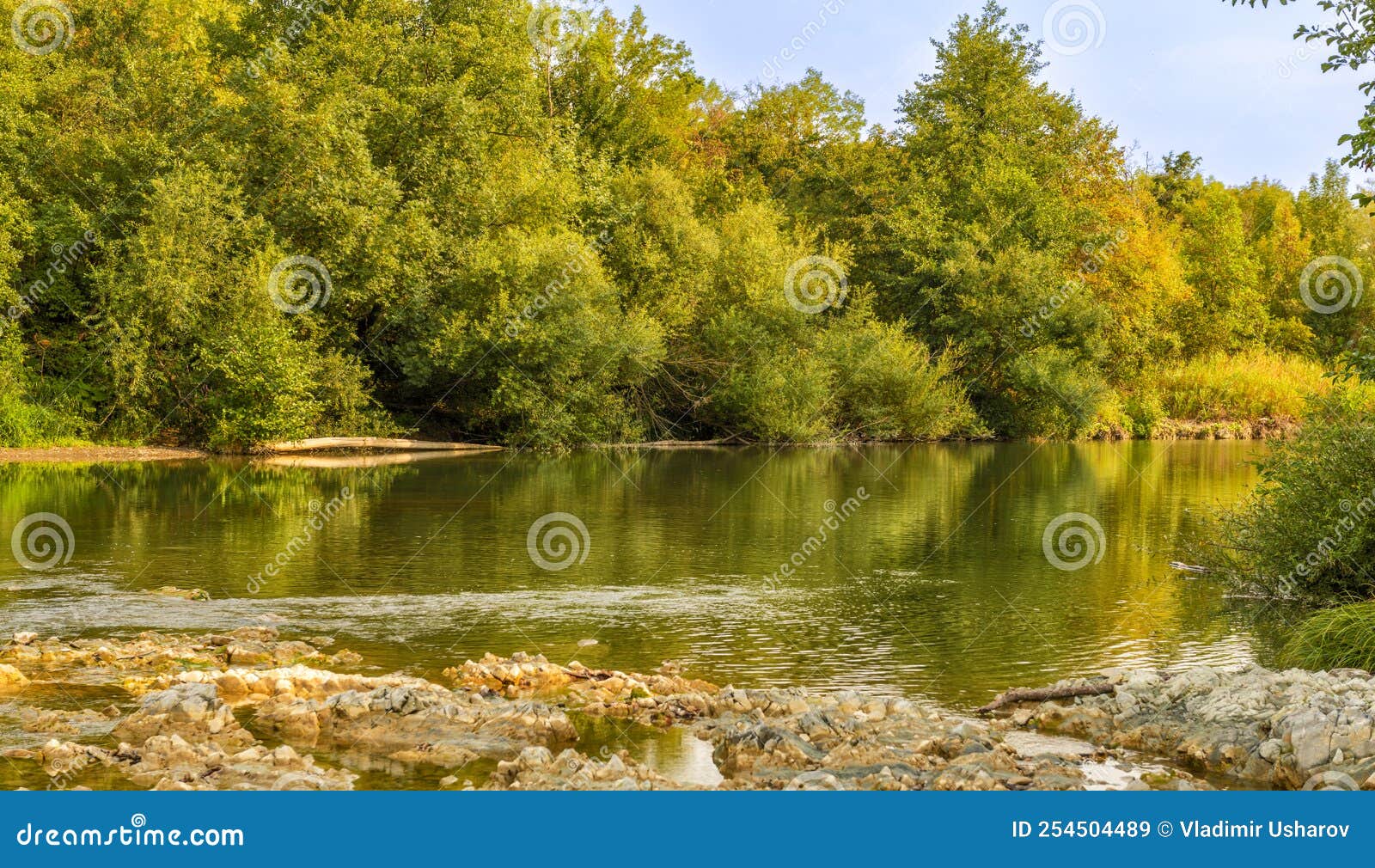 A Quiet Wide Place on the River with a Smooth Water Surface Stock Image ...