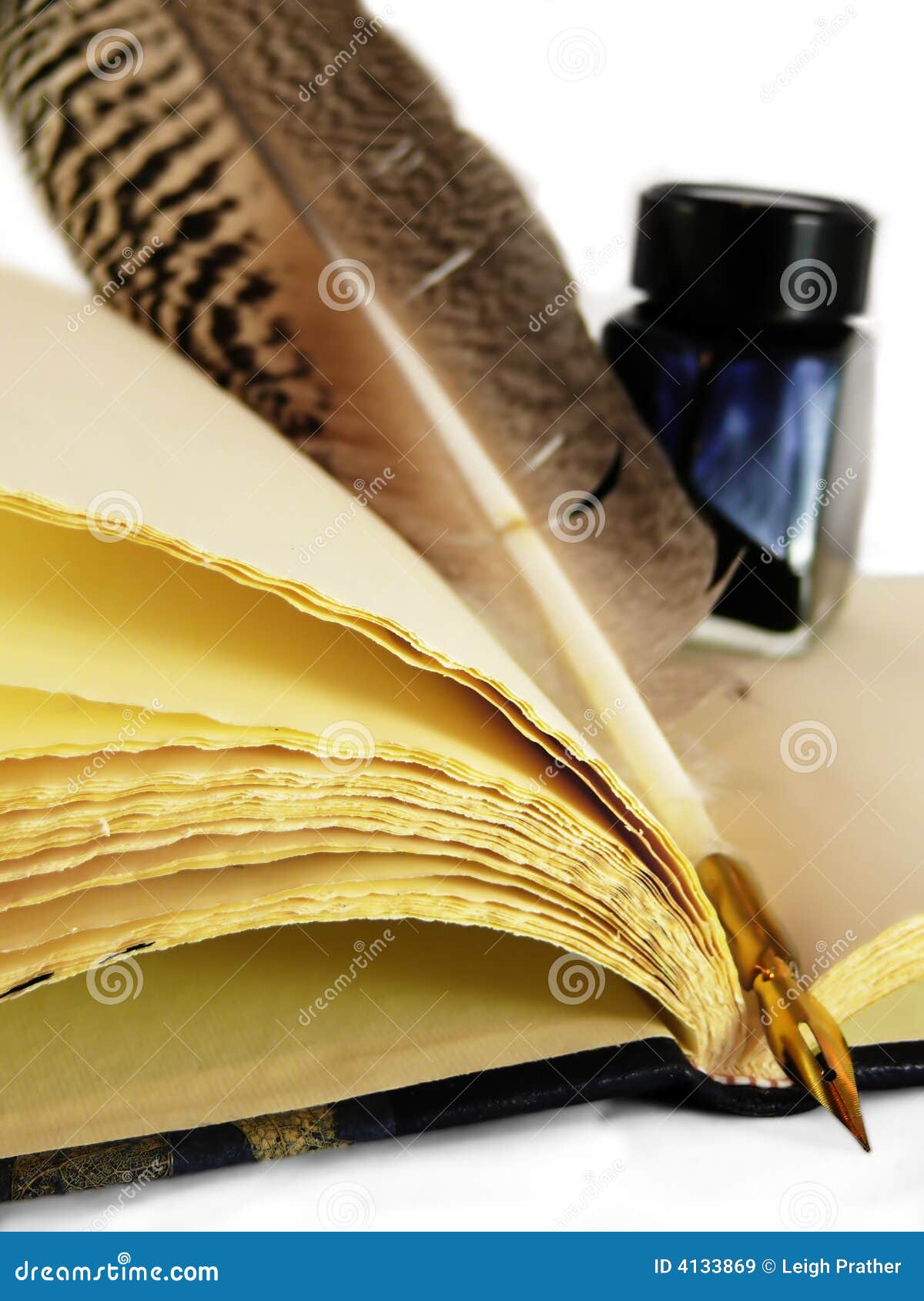 Quill & Inkwell on an Book Stock Image - Image of book, inkwell: 4133869