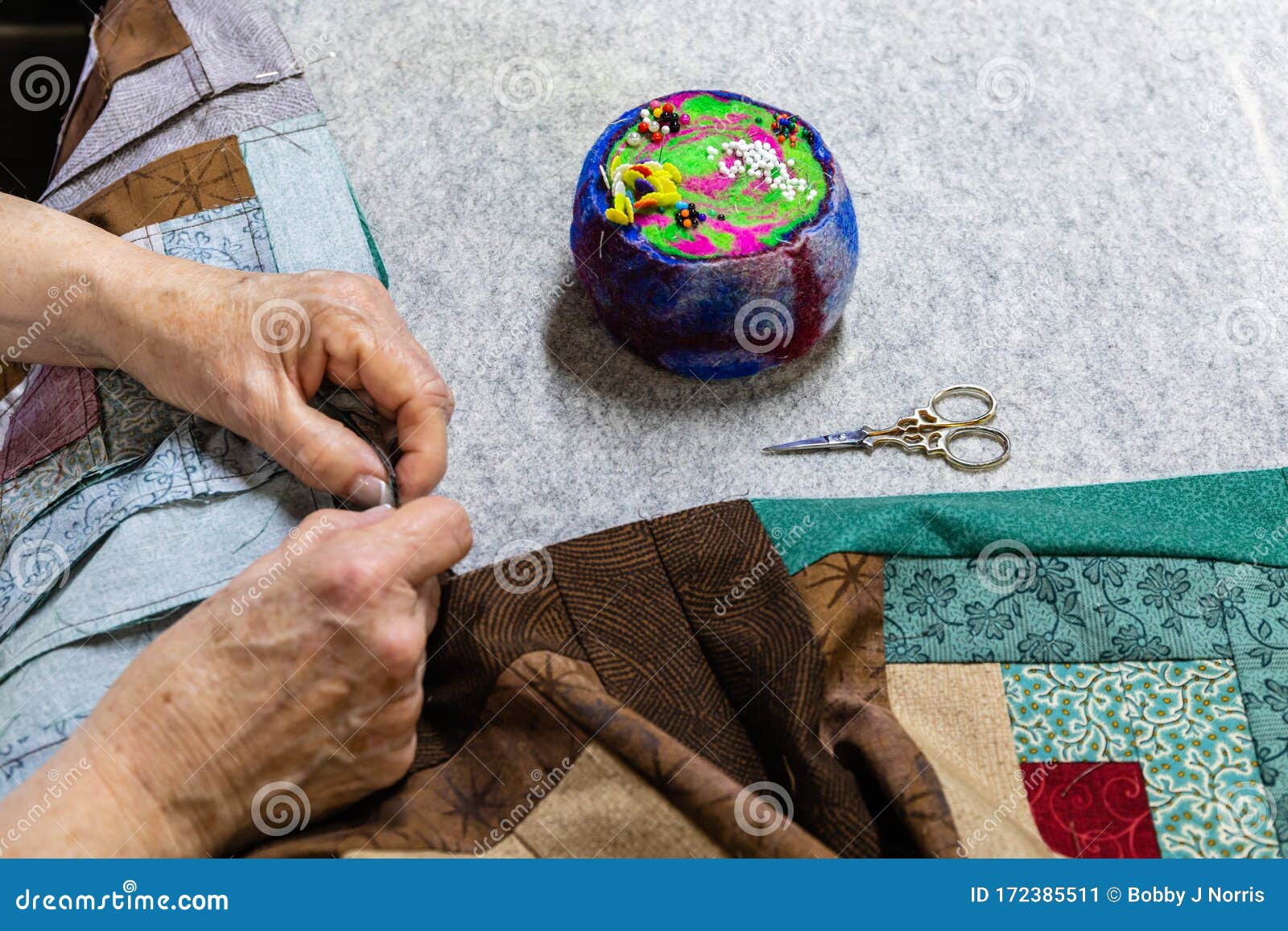 Quilter Sewing Fabrics and Patterns Using Various Tools Stock Image ...