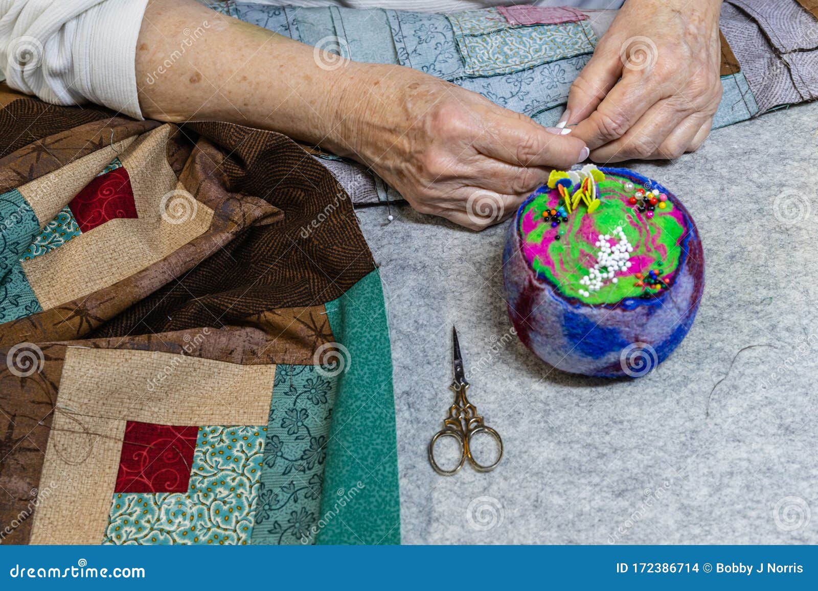 Quilter Sewing Fabrics and Patterns Using Various Tools Stock Photo ...