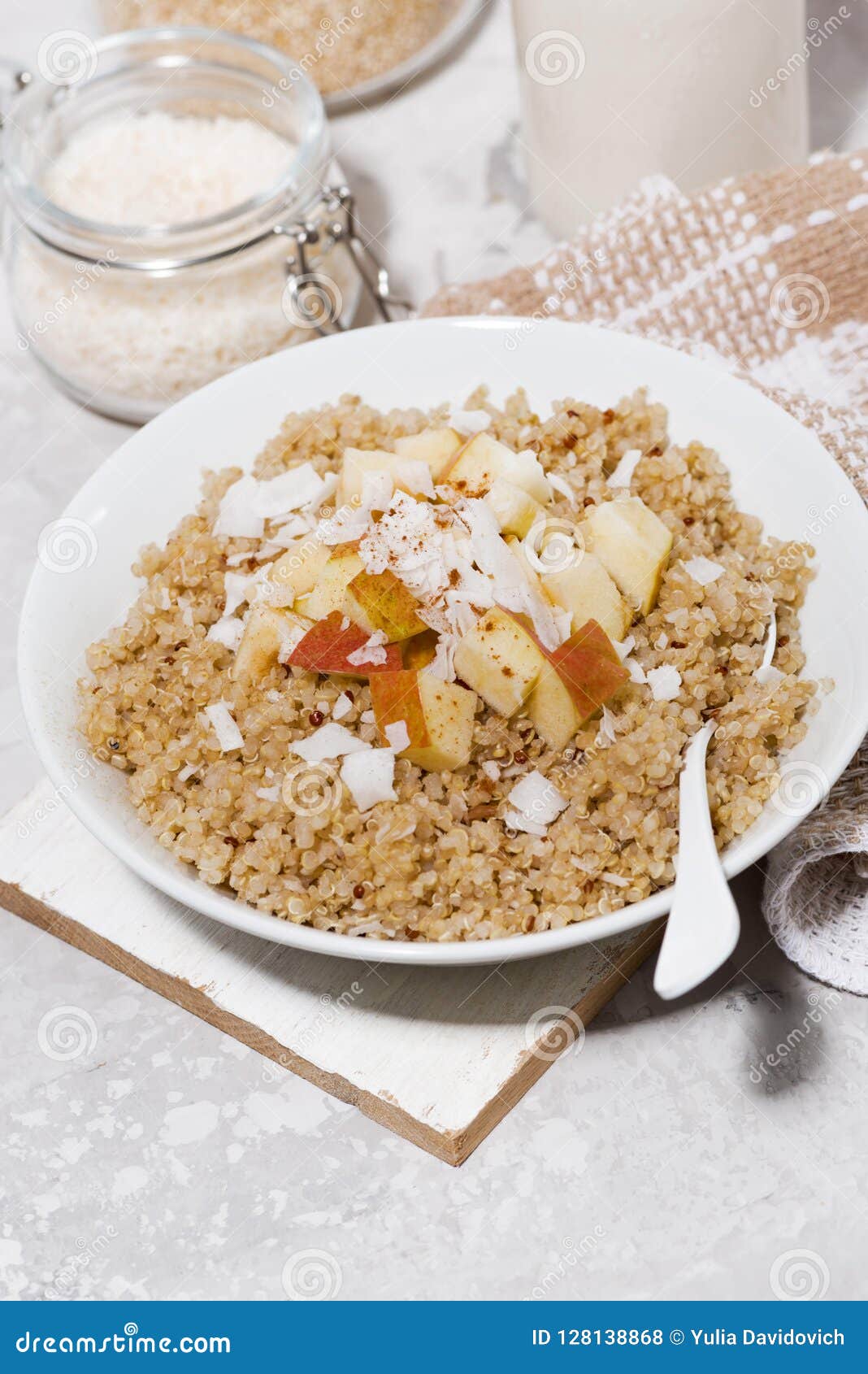 Quinoa with Apple and Coconut for Healthy Breakfast, Vertical Stock ...