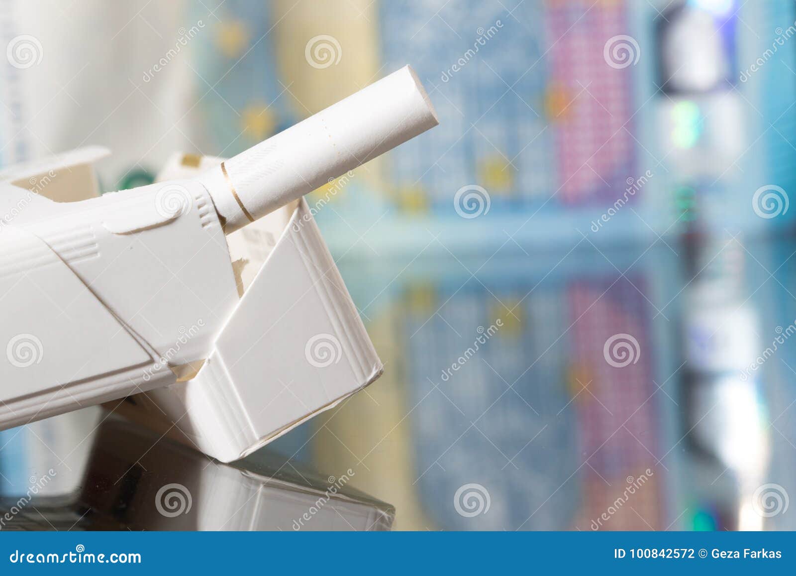 A Cigar Box and Money in Background Stock Photo - Image of cigarettes ...