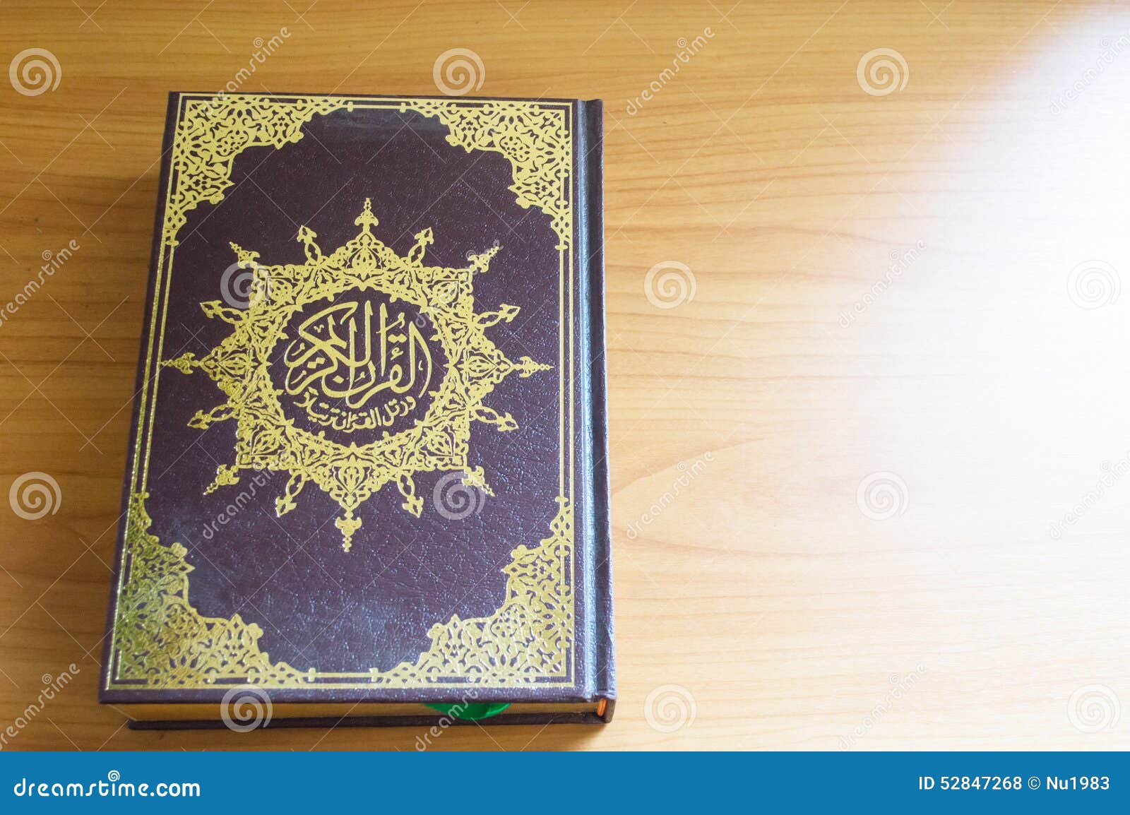 Quran on the wooden table stock photo. Image of holy - 52847268