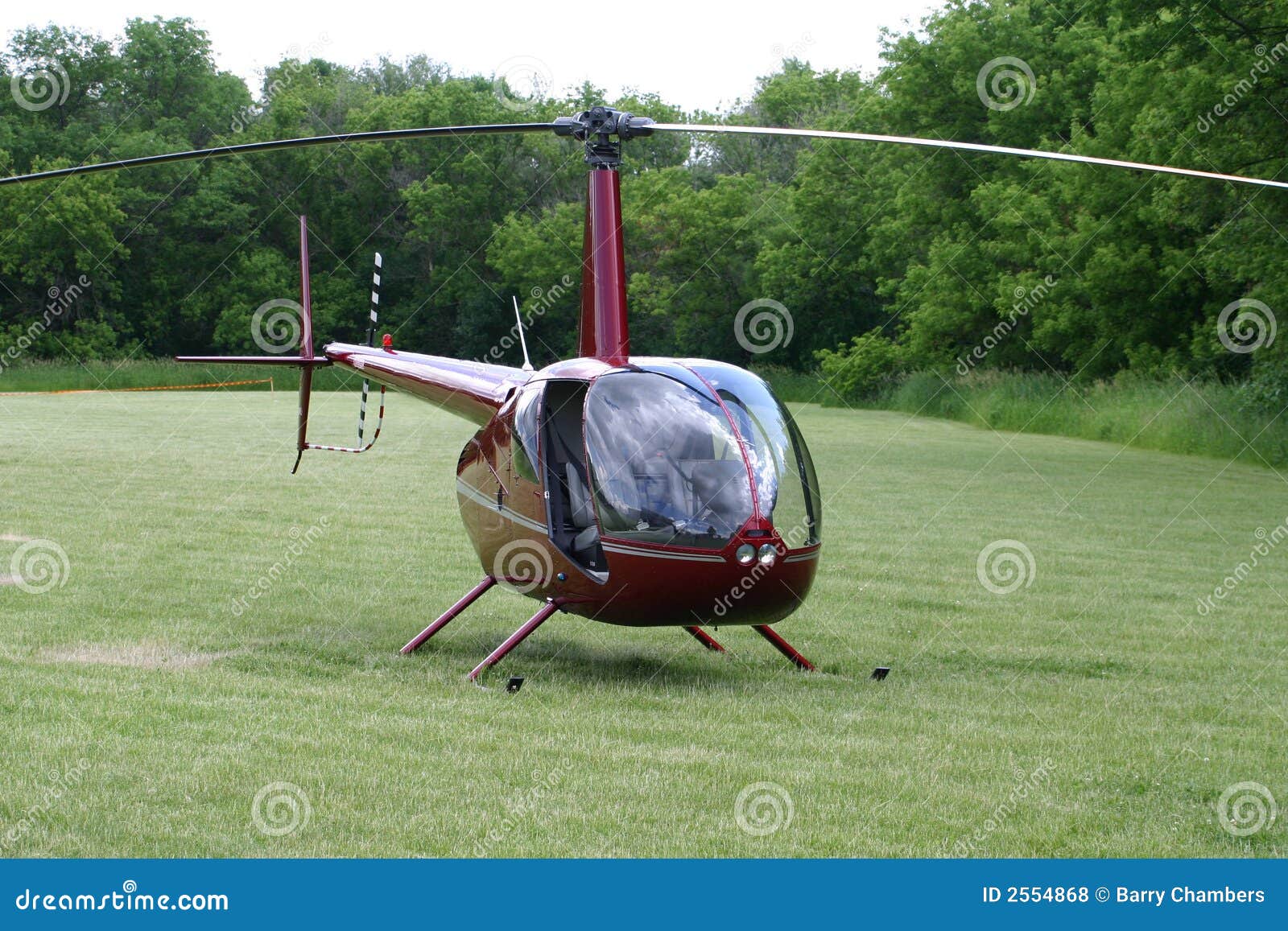 R44 Helicopter in red stock photo. Image of wing, bubble - 2554868