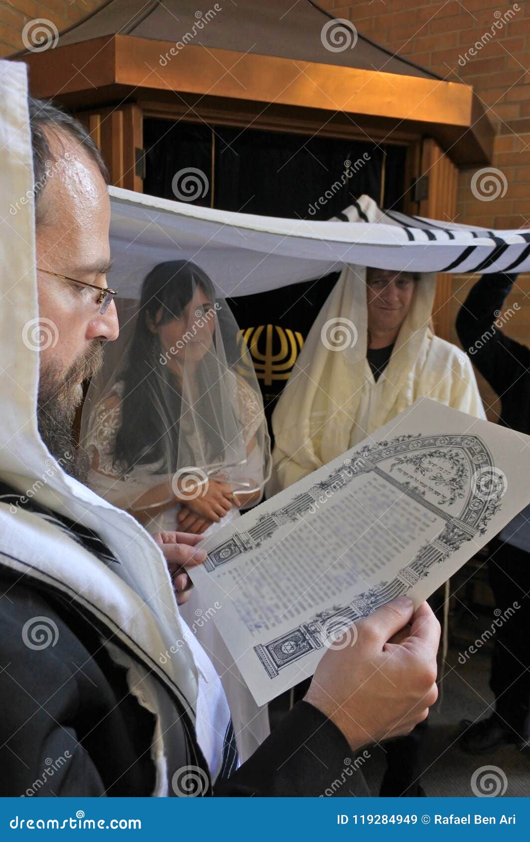 Rabbi Reads The Prenuptial Agreement Of A Jewish Bride And A Bridegroom