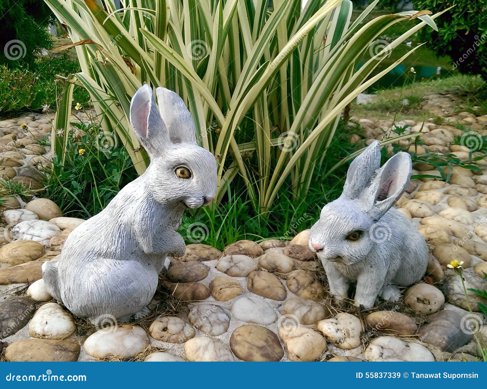 Rabbits Decorative garden stock image. Image of rabbits - 55837339