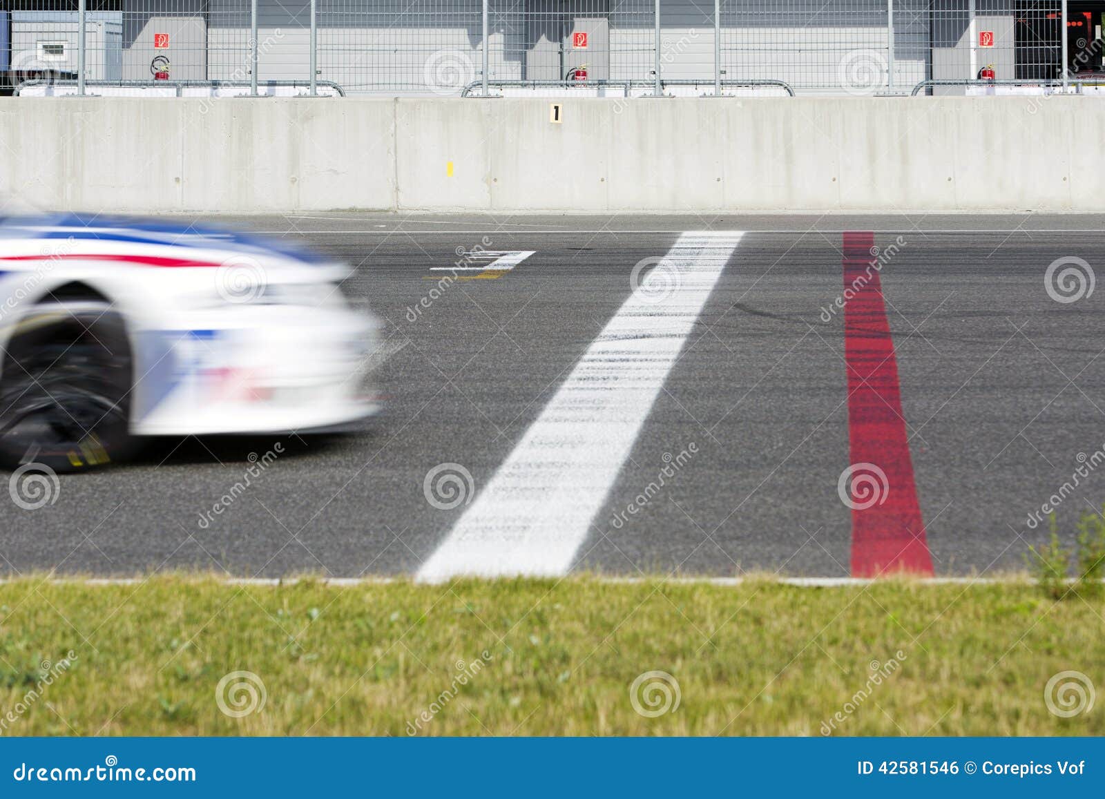 Race Car Crossing the Finish Line Stock Photo - Image of finishing ...