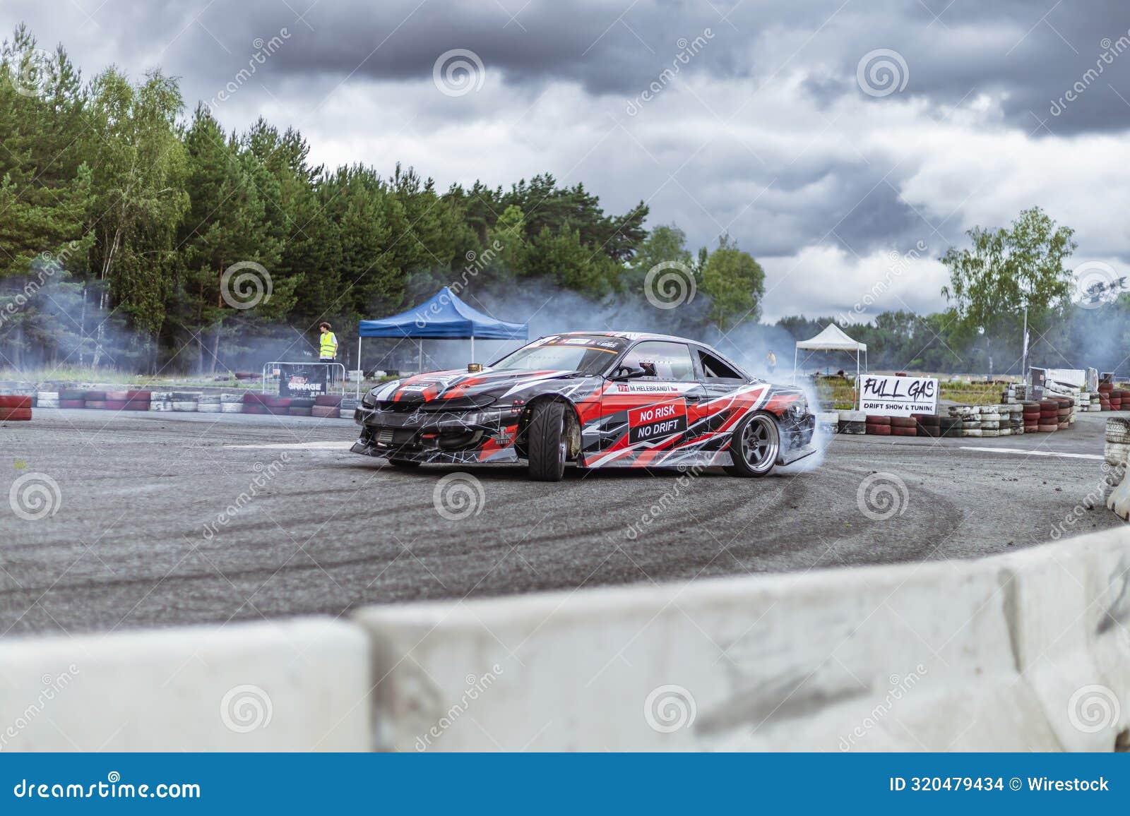 Race Car Making a Turn on a Race Track Editorial Stock Image - Image of ...