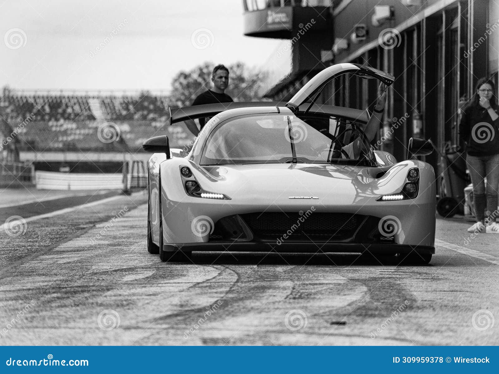 Race car parked on a road editorial stock photo. Image of assembly ...